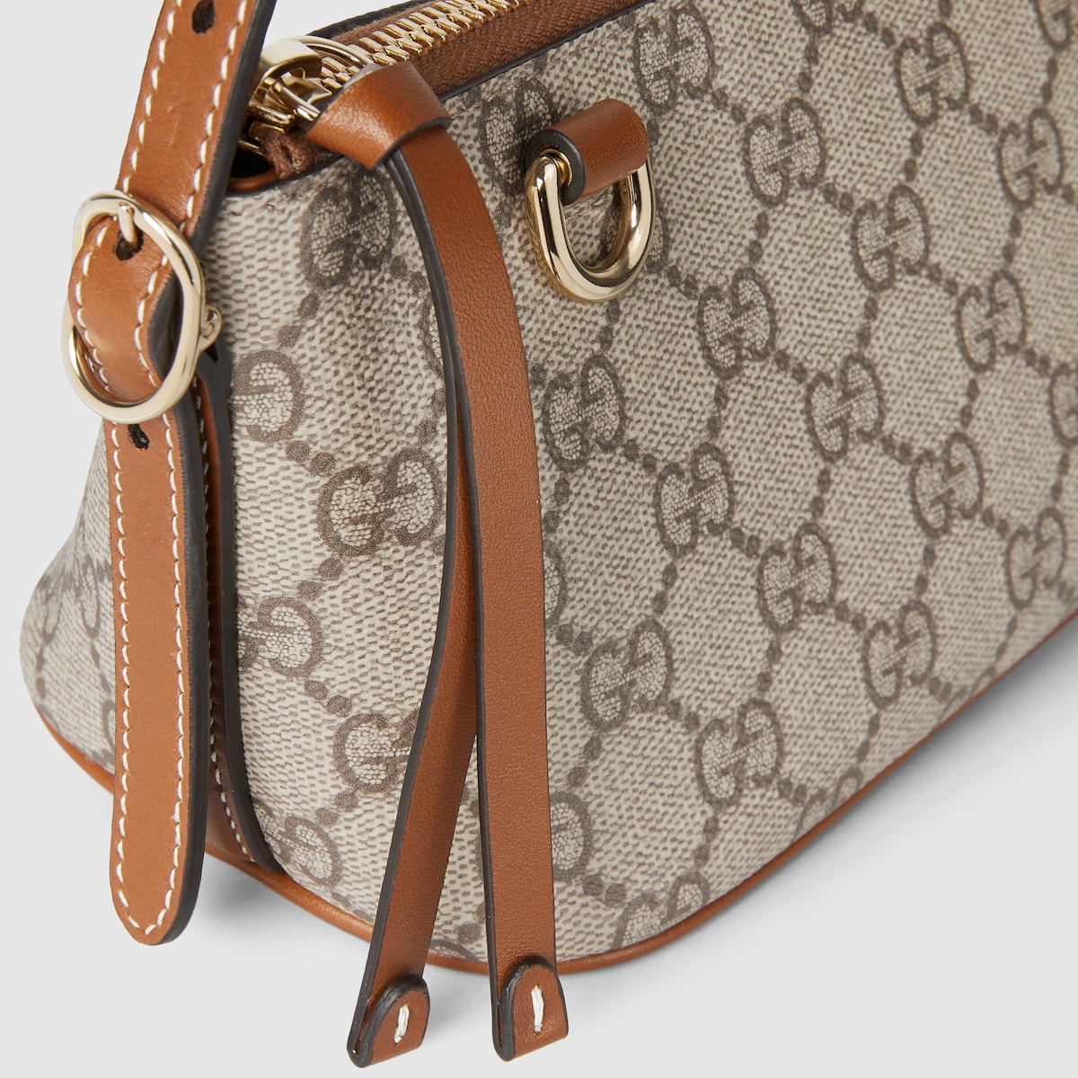 GG Emblem small shoulder bag in beige and dark brown fabric | GUCCI® US