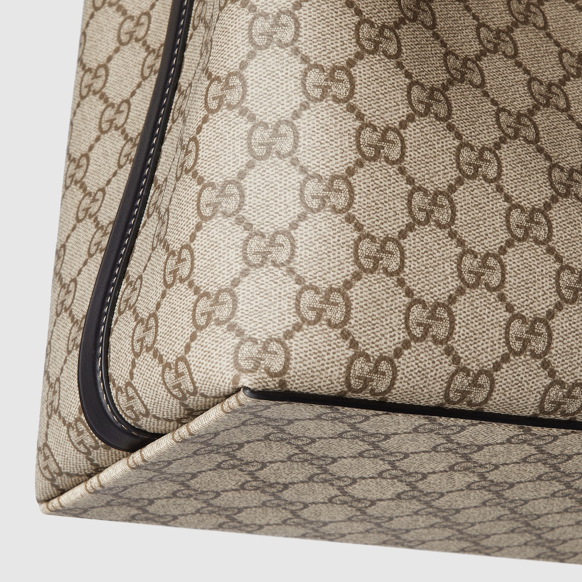 GG Emblem medium bucket bag in beige and brown GG fabric | GUCCI® US