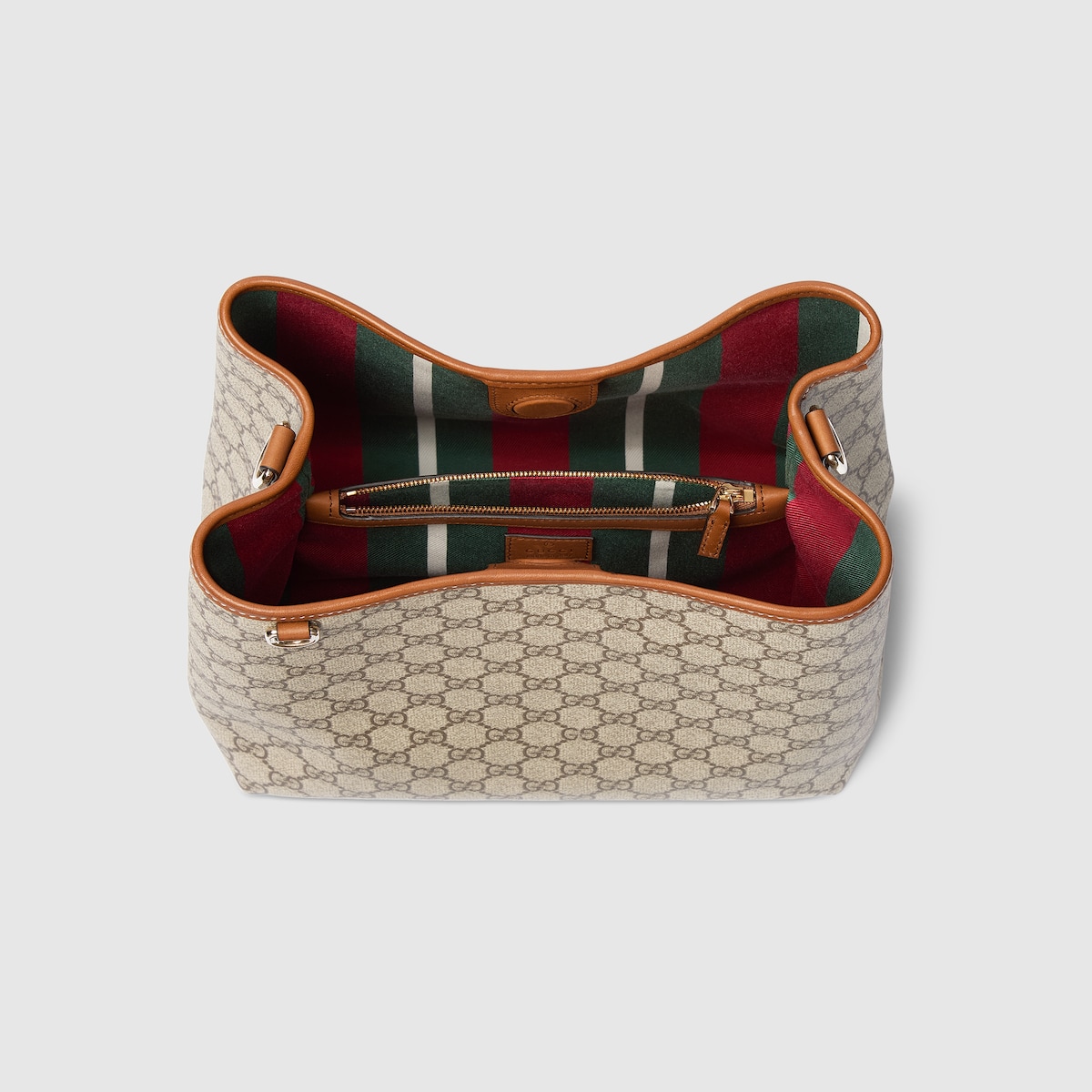 GG Emblem medium bucket bag in beige and brown GG fabric | GUCCI® US