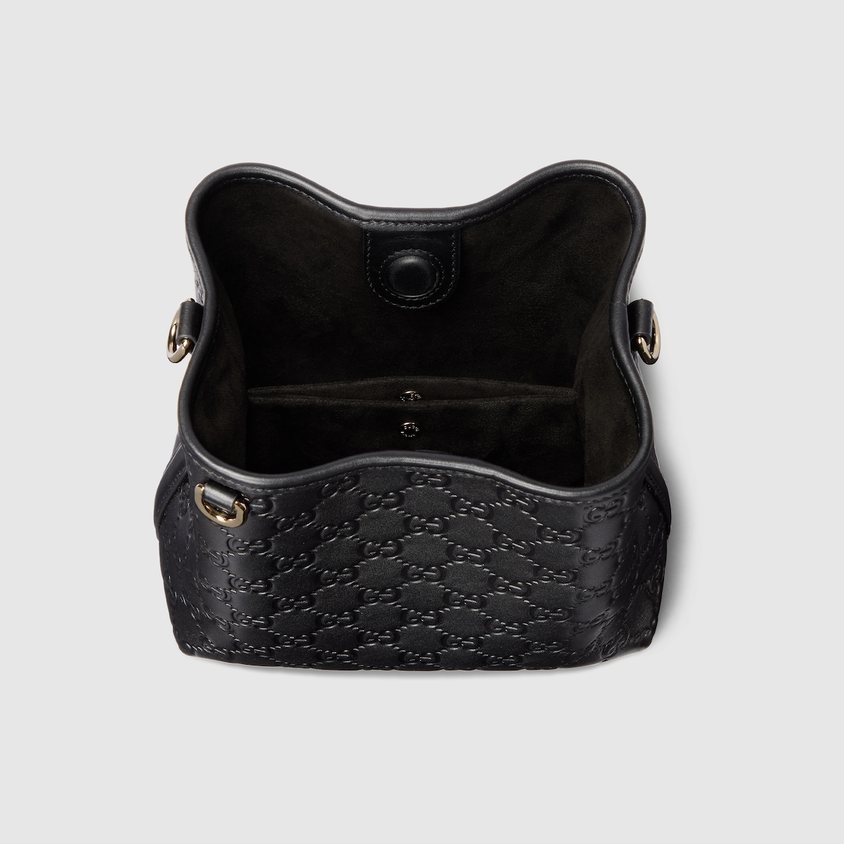 GG Emblem small bucket bag in black GG leather | GUCCI® US