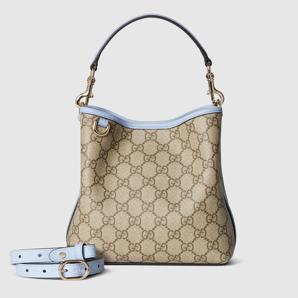 GG Emblem small bucket bag in beige and dark brown fabric | GUCCI® US