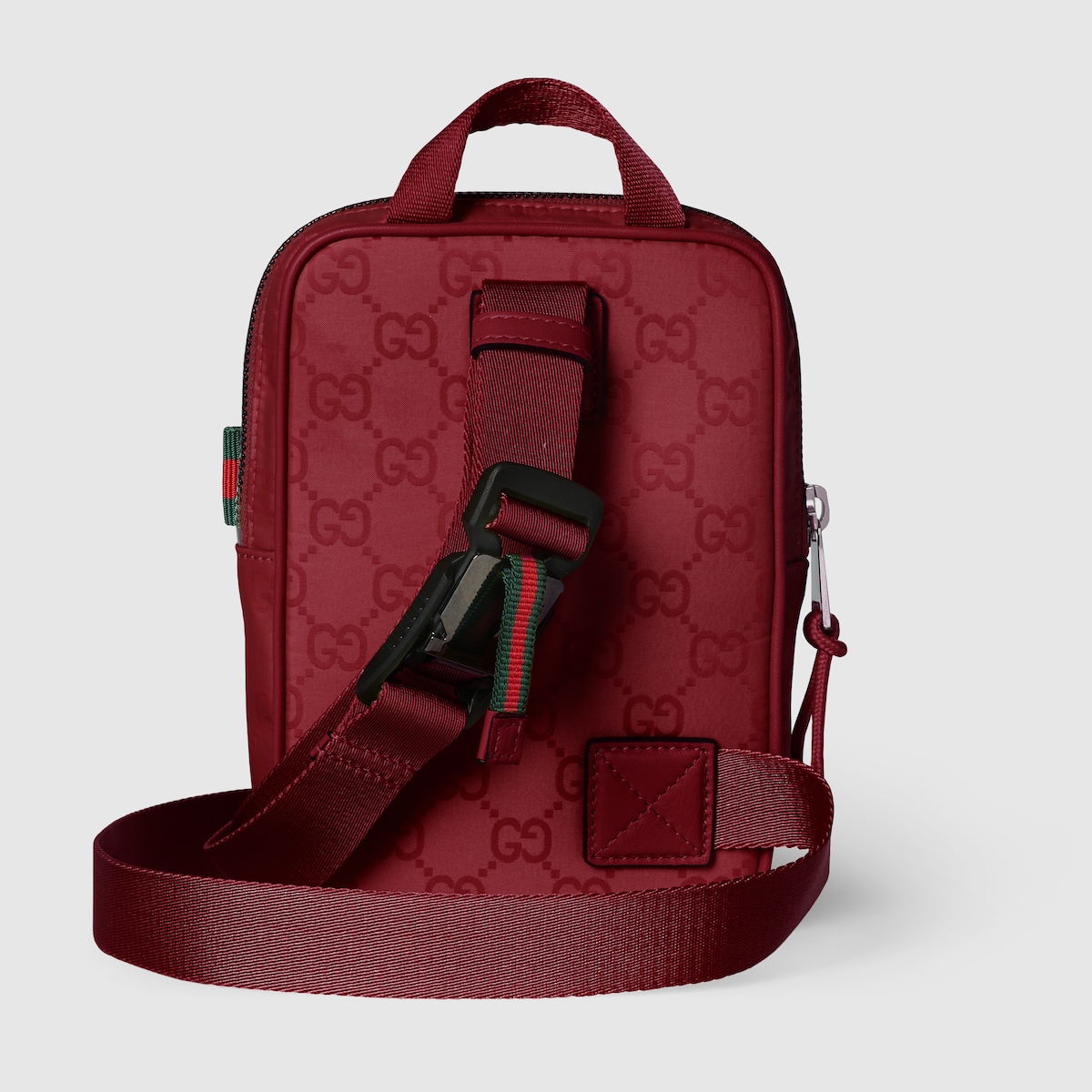 Gucci Nexus mini slingbag in Rosso Ancora red GG nylon | GUCCI® US