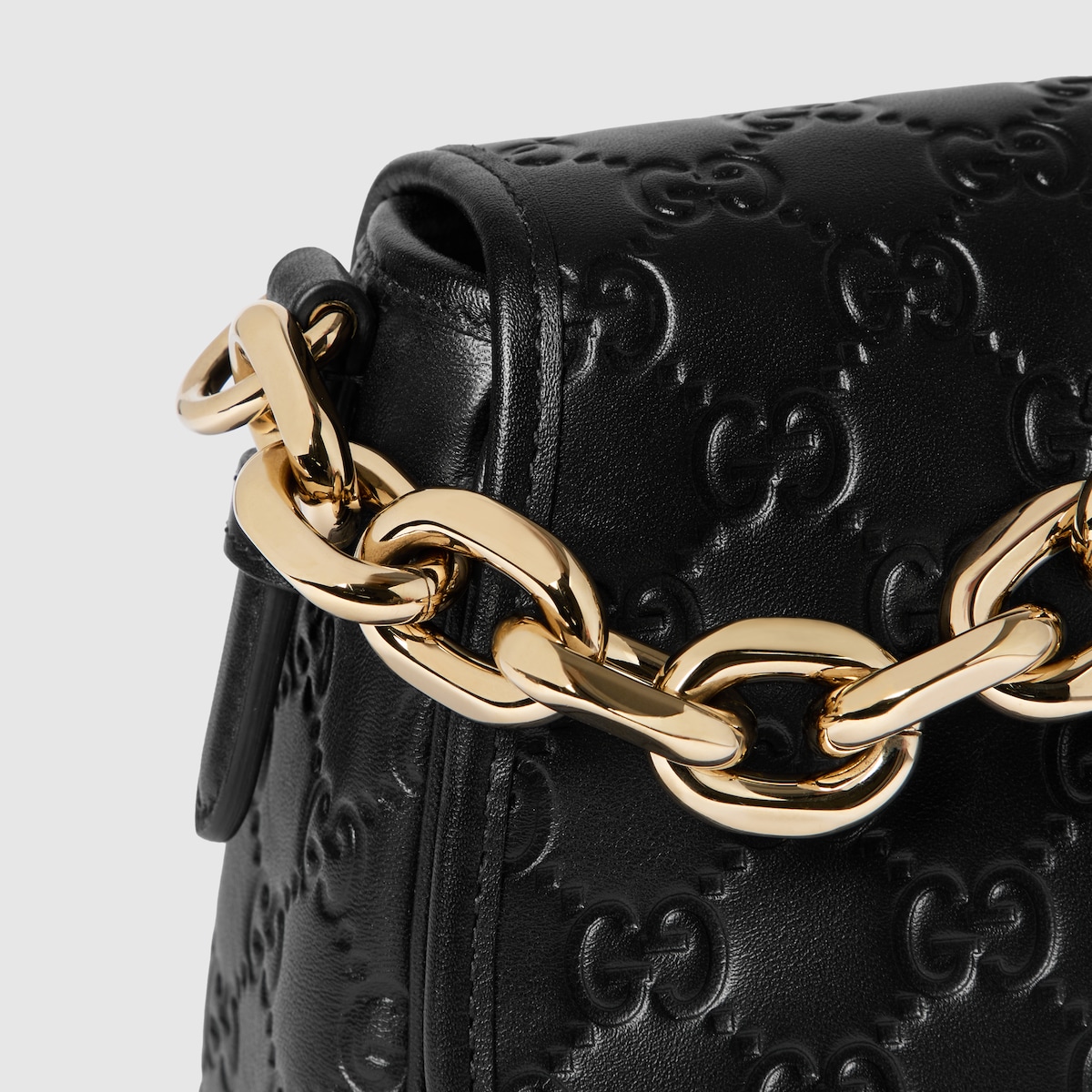 GG Emblem medium shoulder bag in black GG leather | GUCCI® TR