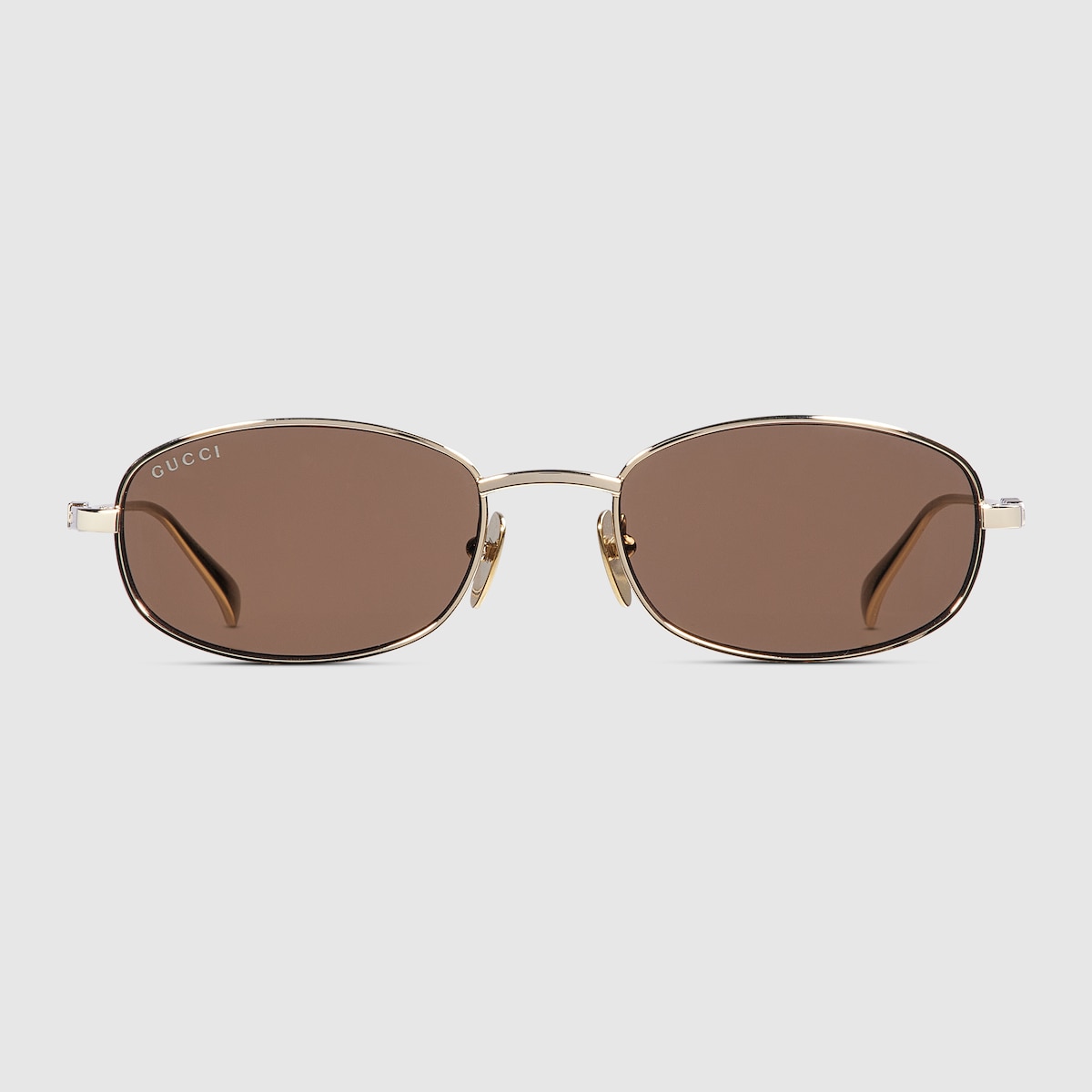 Oval frame sunglasses in light gold | GUCCI® US