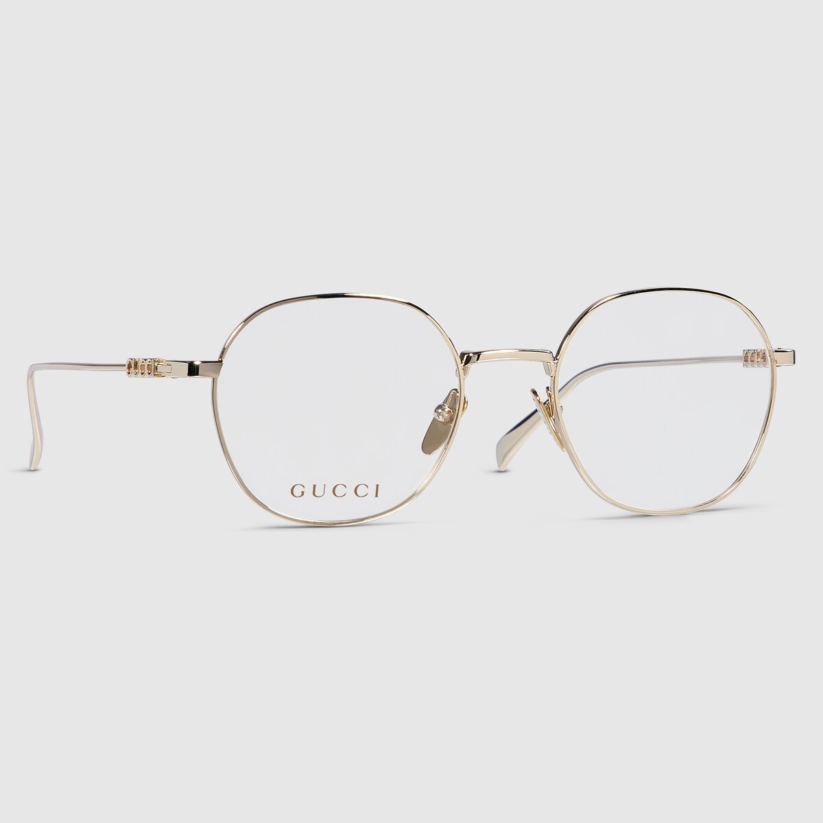 Round optical frame in light gold | GUCCI® UK