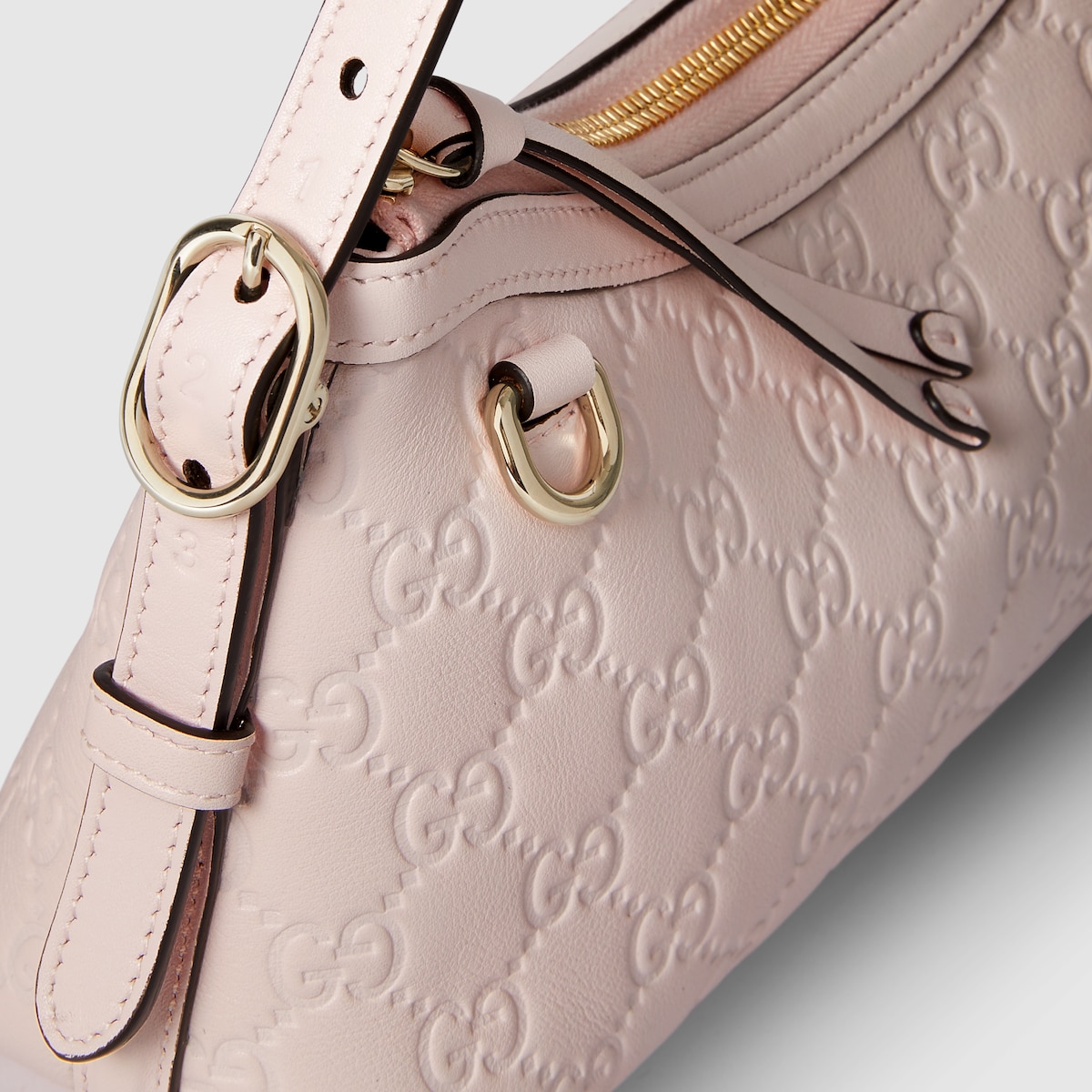 GG Emblem small shoulder bag inpink GG leather | GUCCI® International