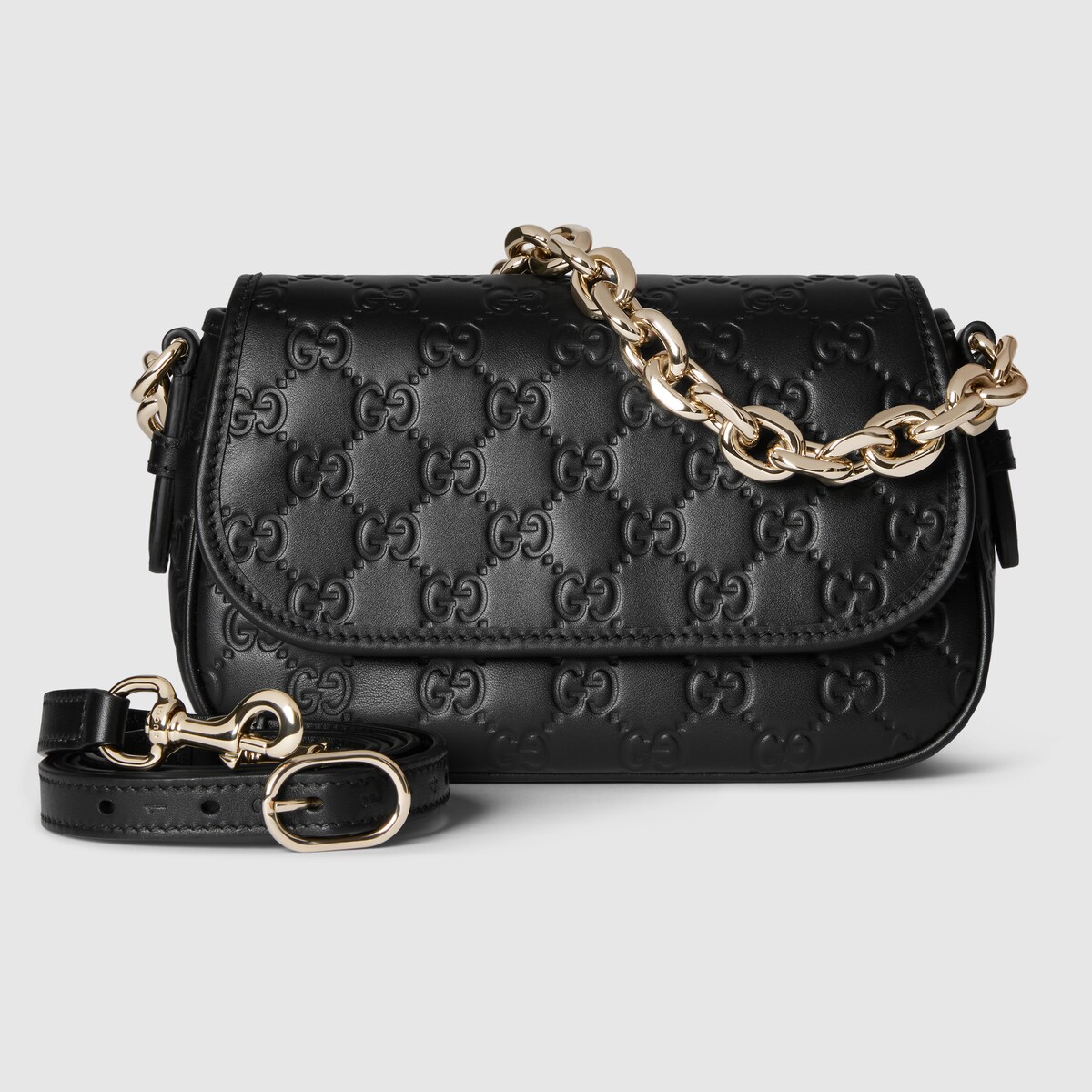 GG Emblem small shoulder bag in black GG leather | GUCCI® SG