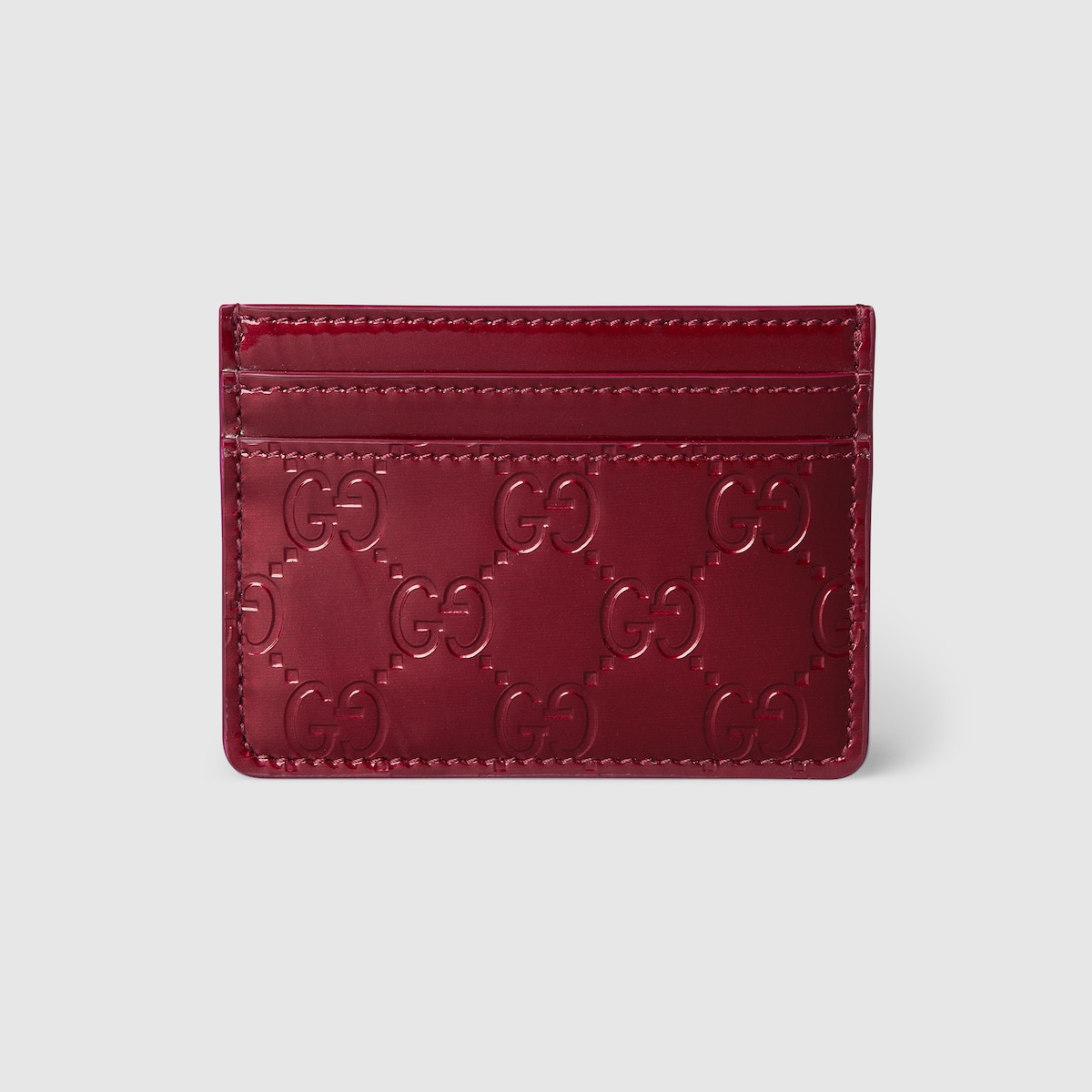 GG Emblem card case in Rosso Ancora red GG leather | GUCCI® US