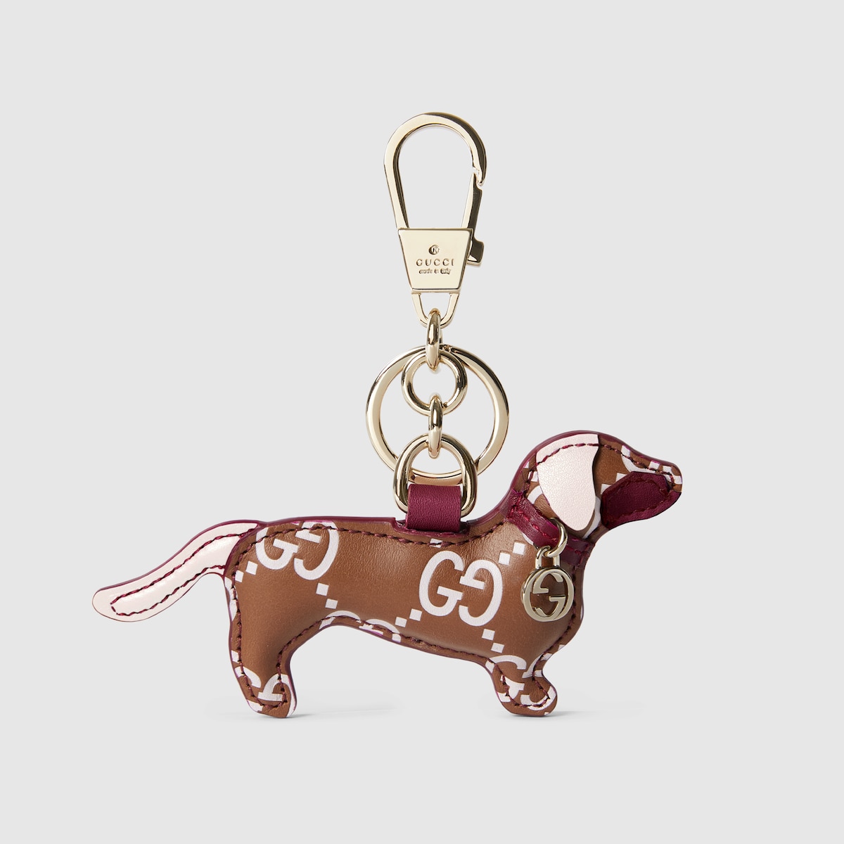 Dog-shaped bag charm in brown and pink GG leather | GUCCI® US