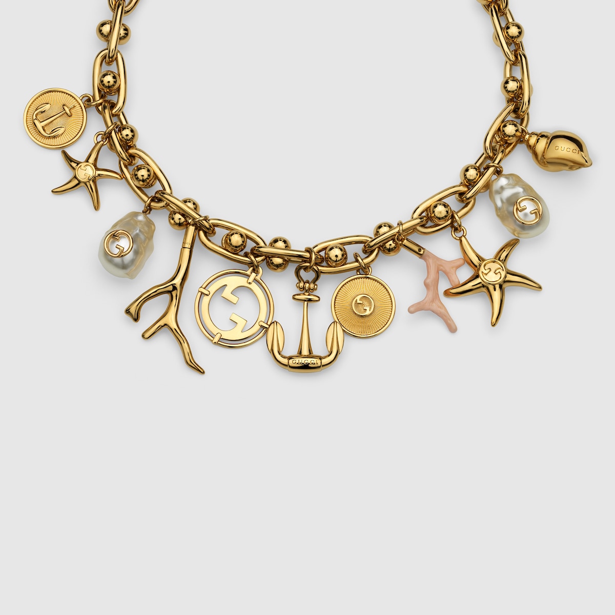 Chain necklace with Gucci symbols in yellow gold-toned brass | GUCCI® CA