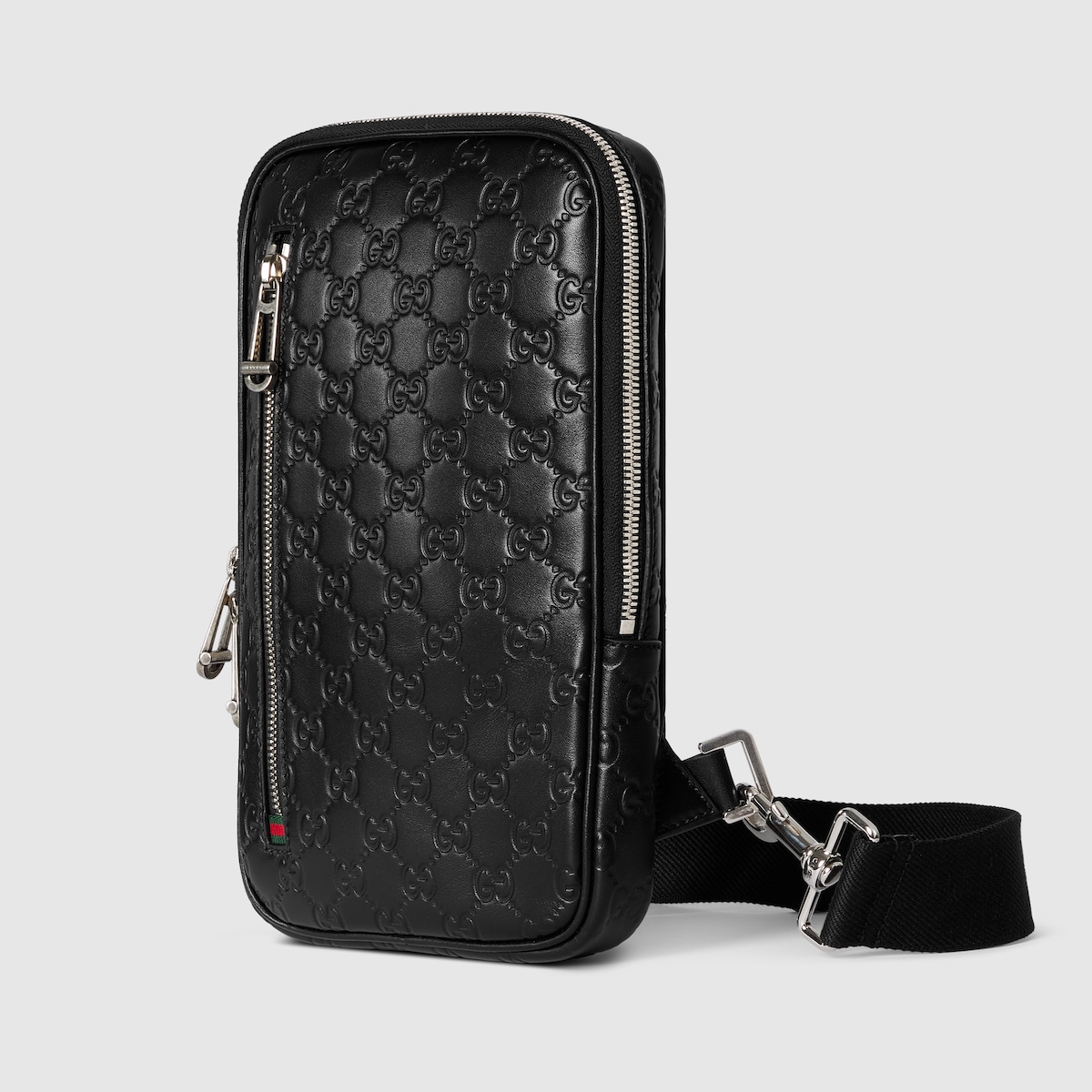 GG Emblem small crossbody bag in black GG leather | GUCCI® INT
