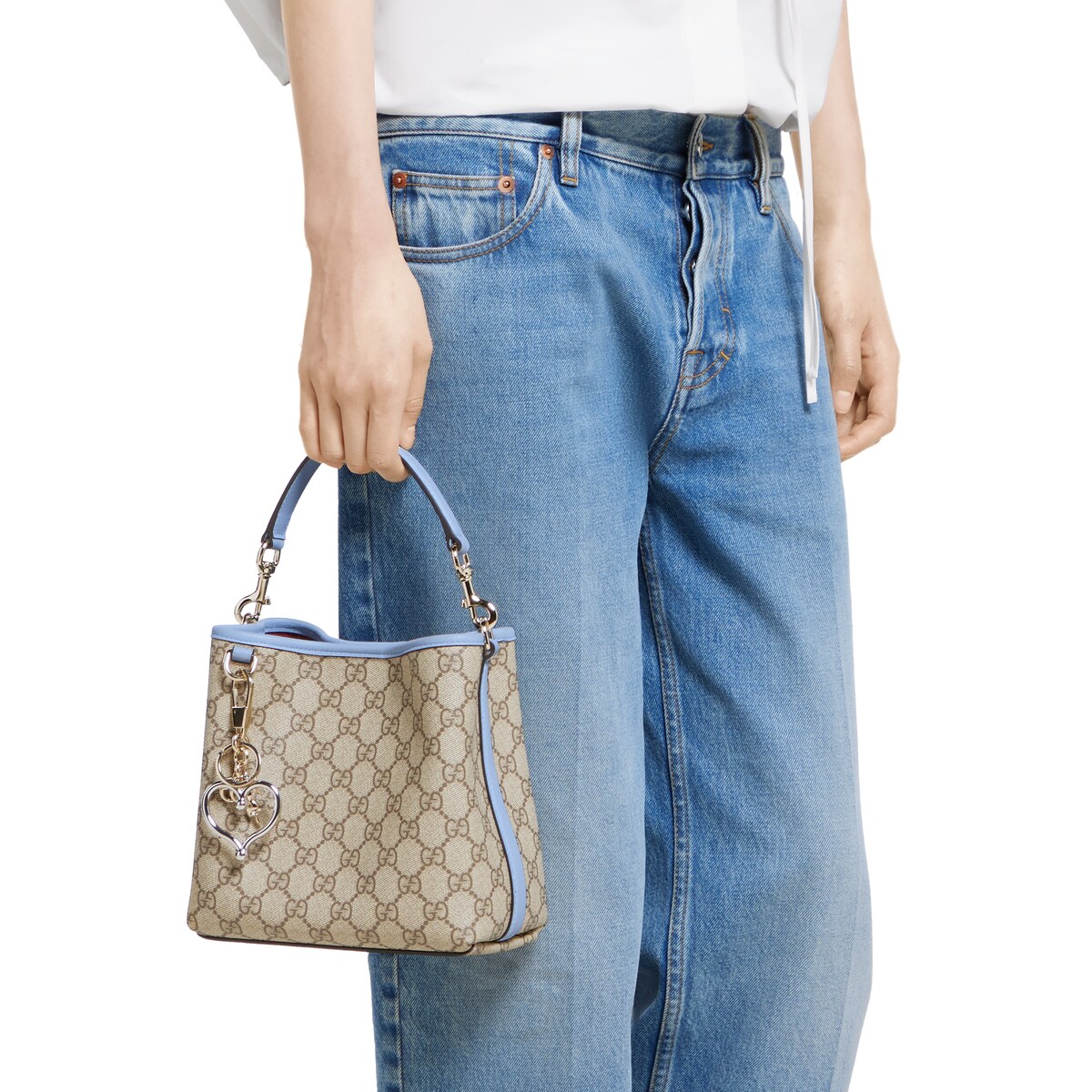 GG Emblem small bucket bag in beige and dark brown fabric | GUCCI® UK