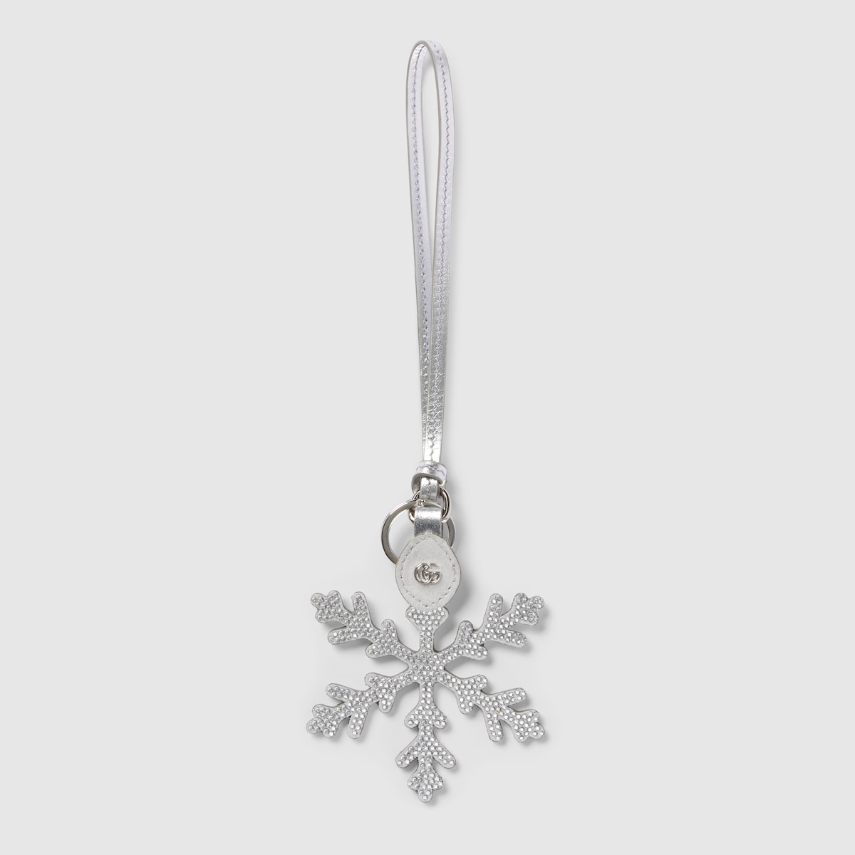 Snowflake-shaped bag charm in silver leather | GUCCI® SG