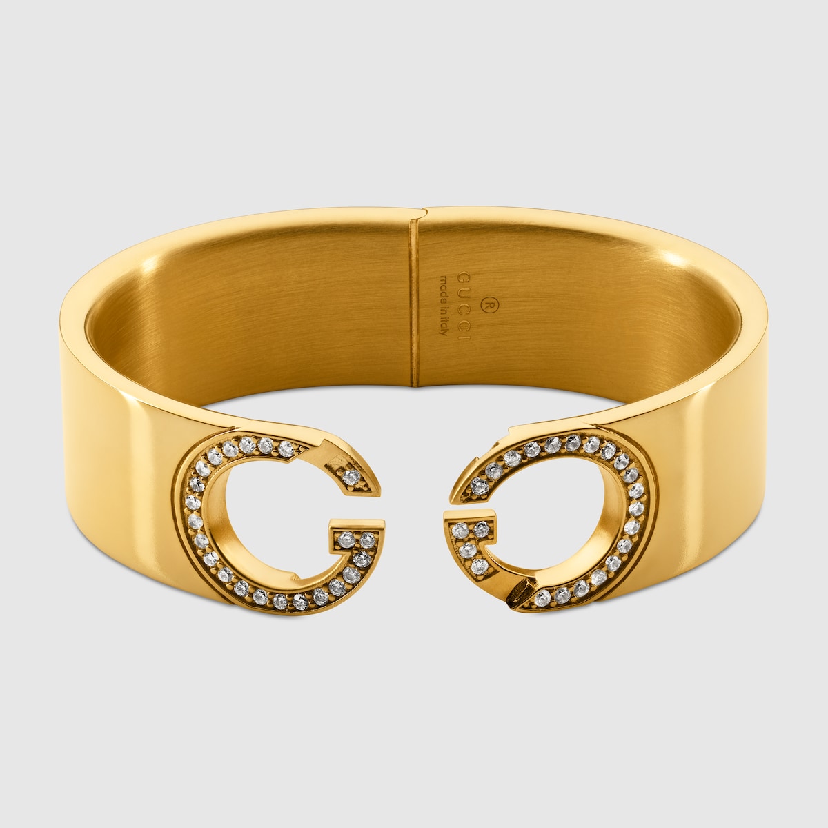 Gucci Interlocking crystal cuff bracelet in gold-toned brass | GUCCI® IE