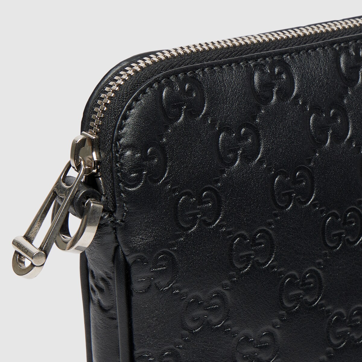 GG Emblem medium crossbody bag in black GG leather | GUCCI® US