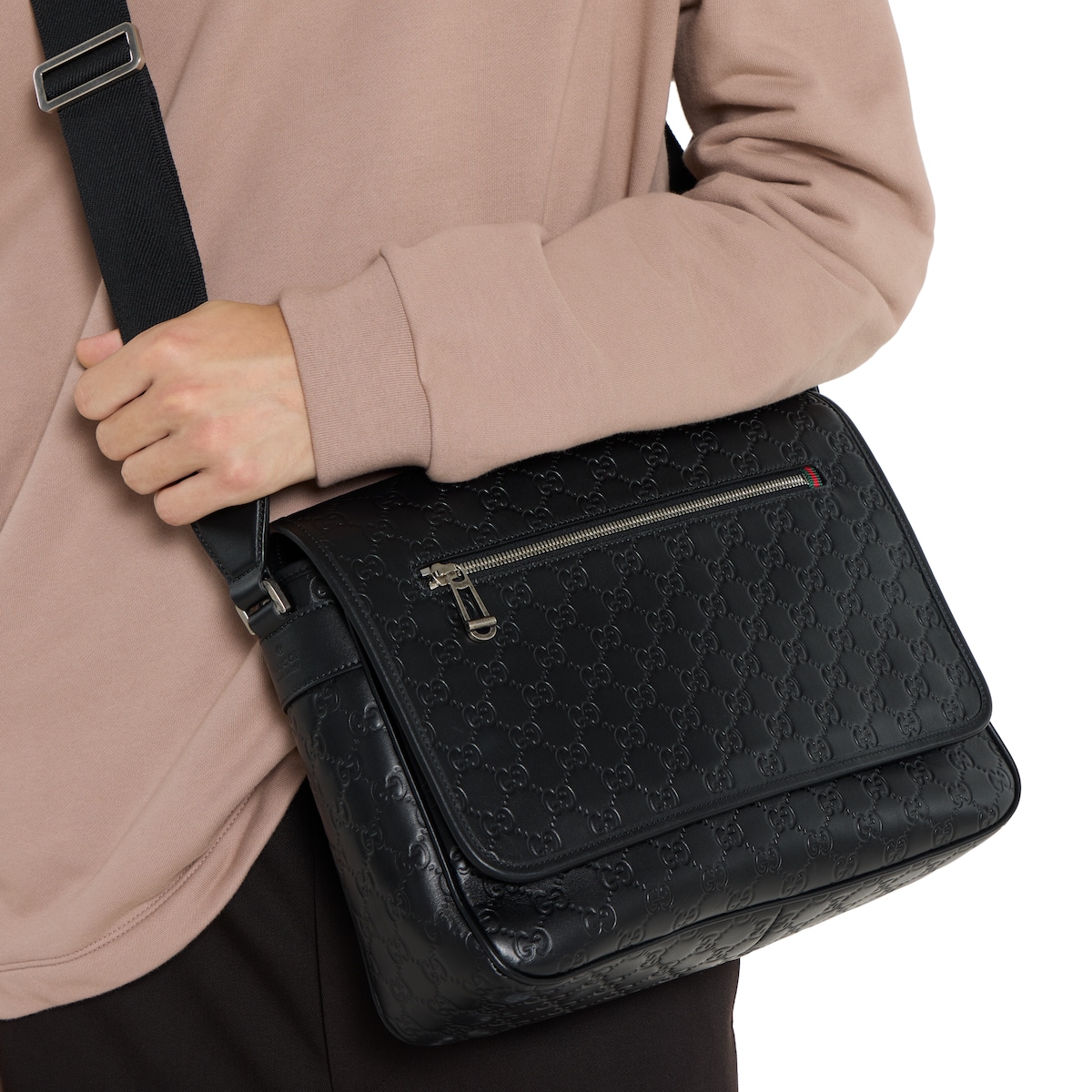 GG Emblem medium crossbody bag in black GG leather | GUCCI® US