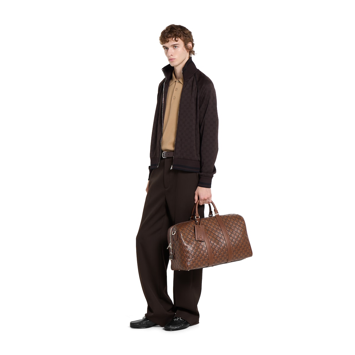 GG Emblem medium duffle bag in brown and black GG leather | GUCCI® CH
