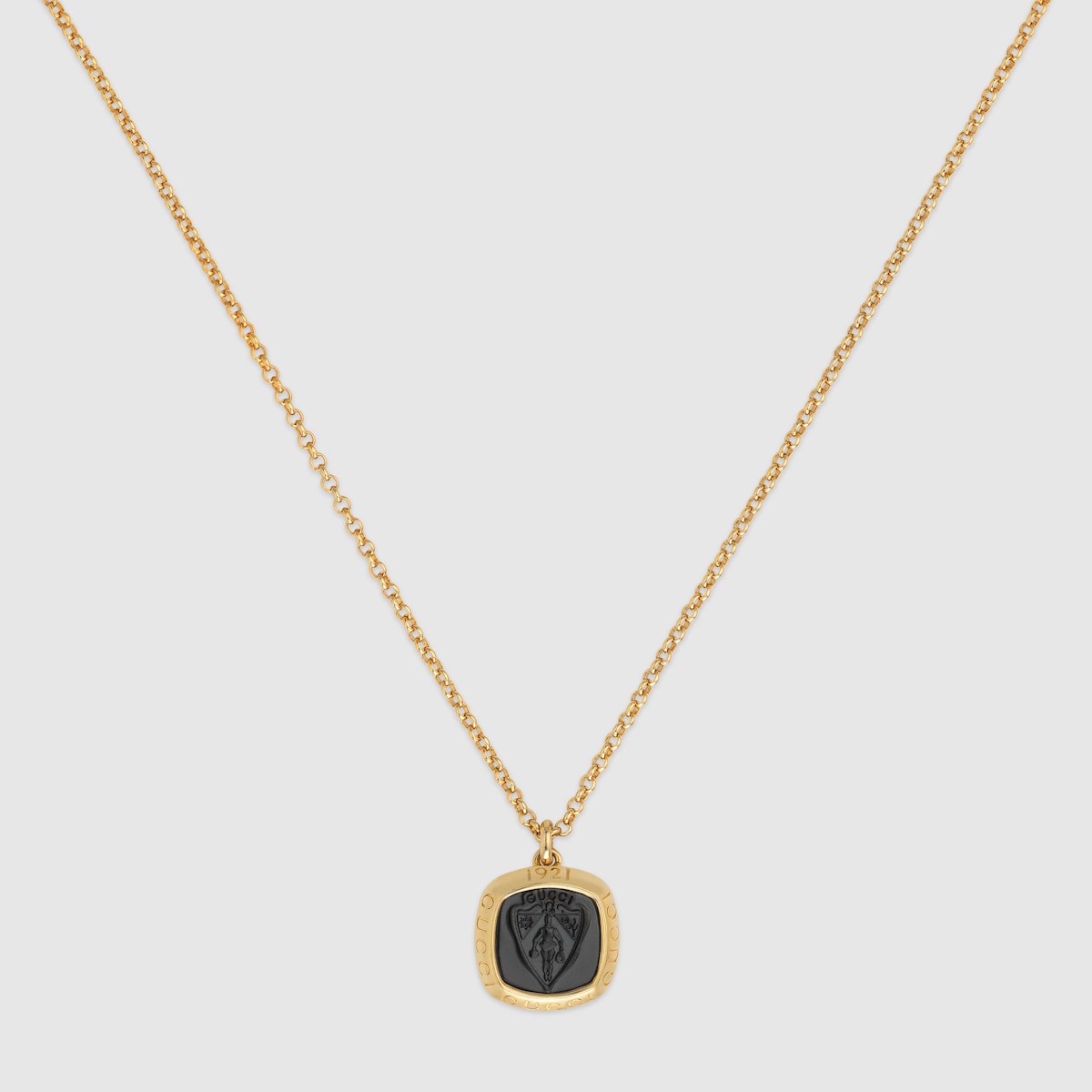 Gucci crest pendant necklace in gold-toned brass | GUCCI® ZA