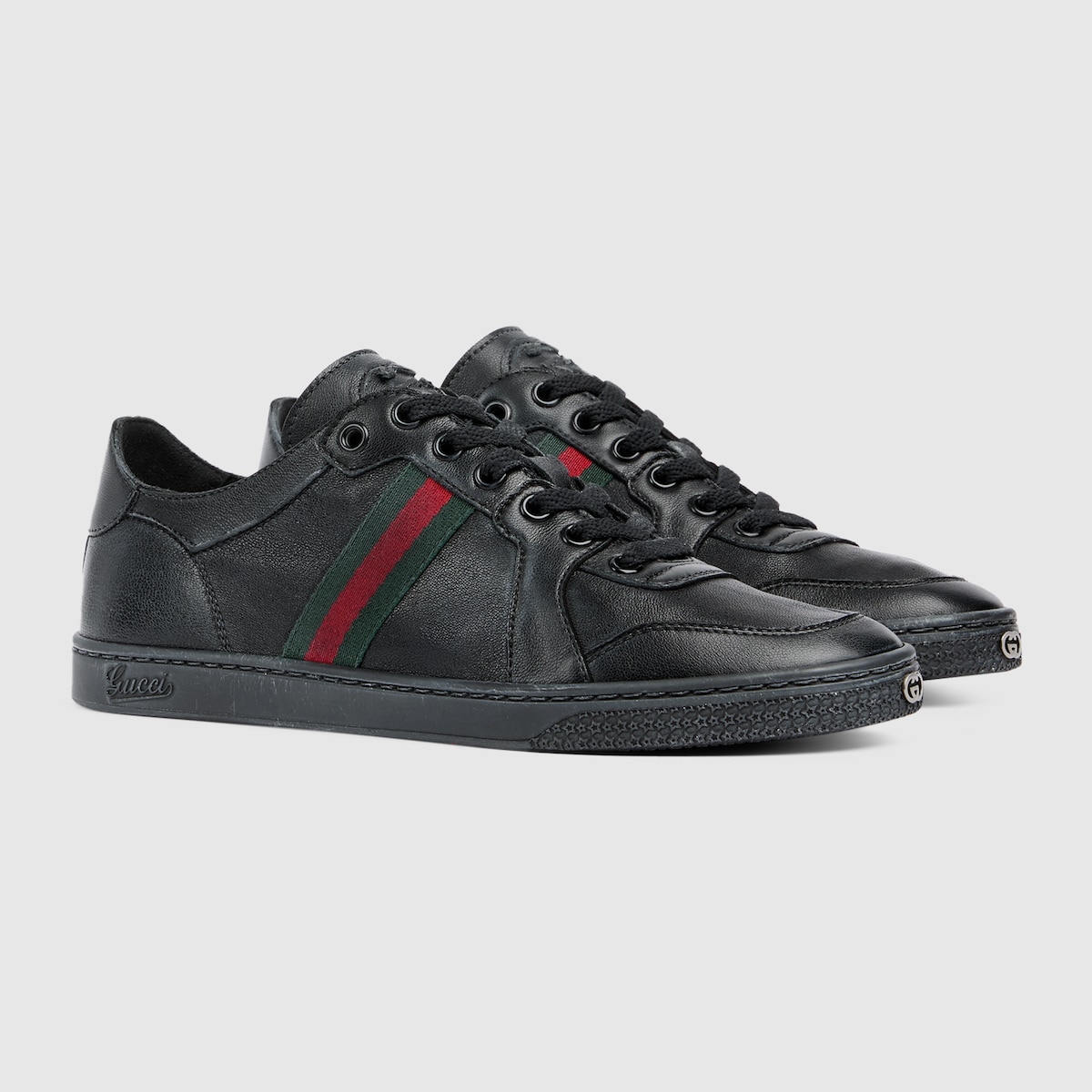 Women's Stretch low-top trainer in black leather | GUCCI® SA