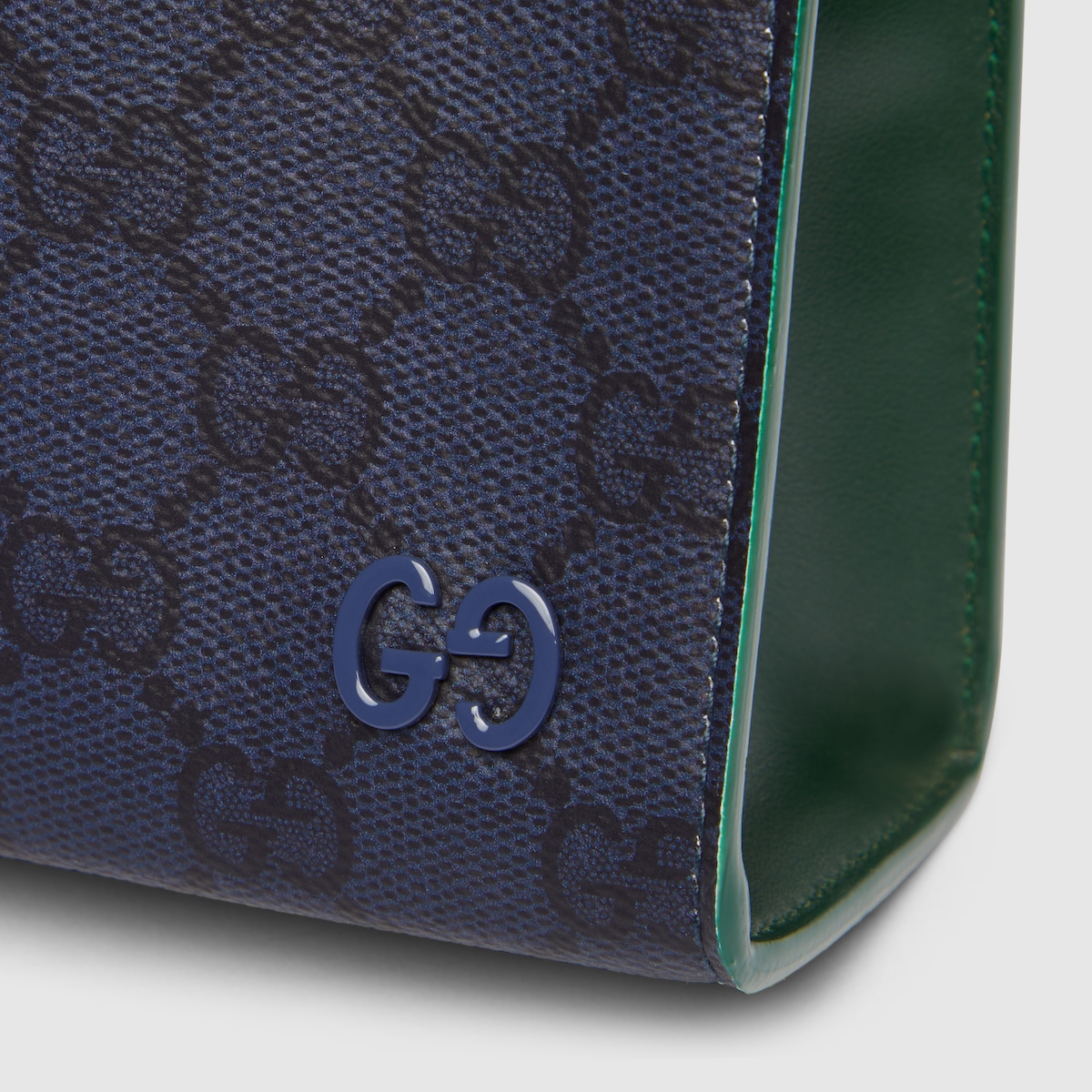 Green trim medium pouch in dark blue GG Supreme | GUCCI® ZA