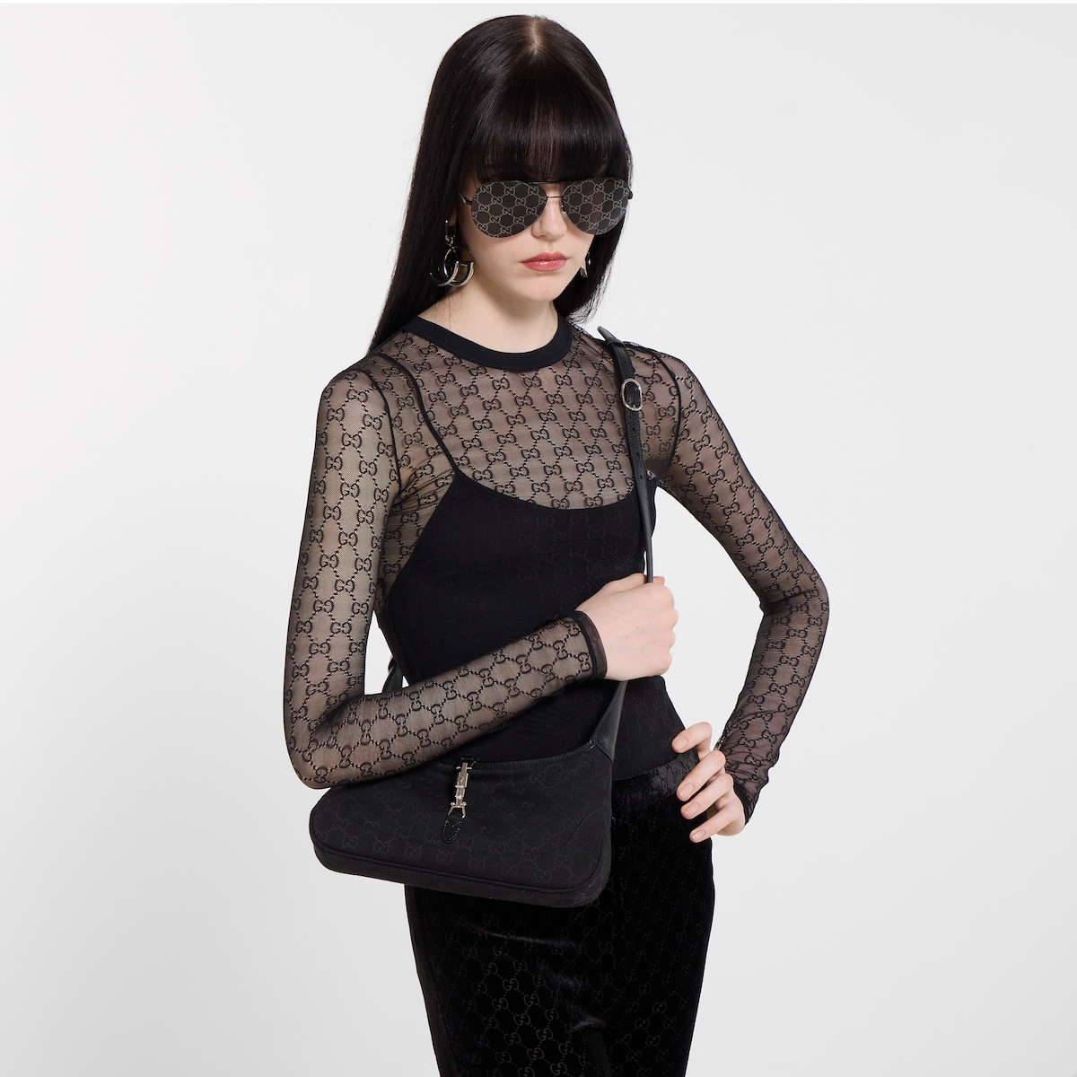 กระเป๋า Jackie Slim small shoulder bag inผ้าแคนวาส GG สีดำ | GUCCI® TH