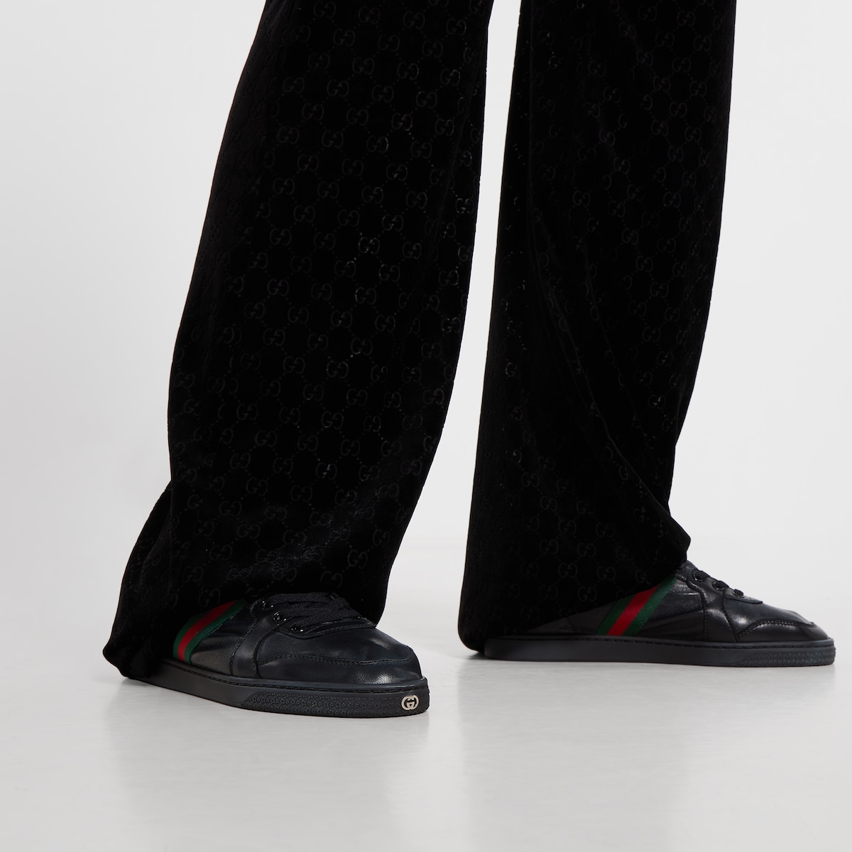 Women's Stretch low-top trainer in black leather | GUCCI® SA