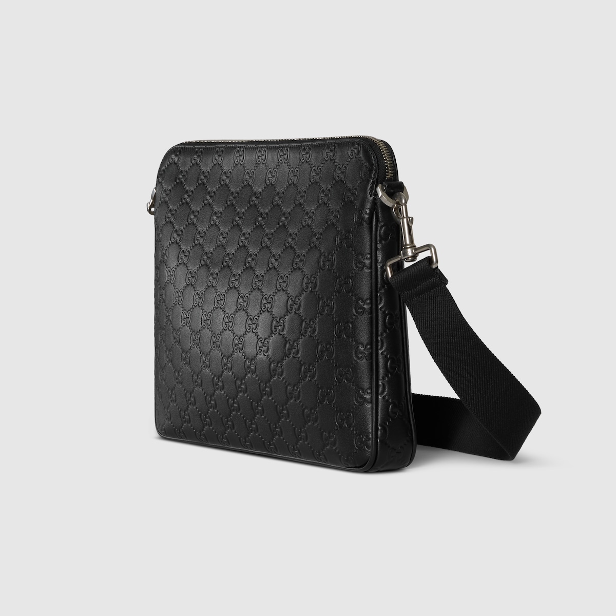 GG Emblem medium crossbody bag in black GG leather | GUCCI® US