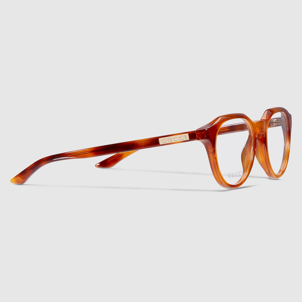 Round optical frame in light brown tortoiseshell | GUCCI® US