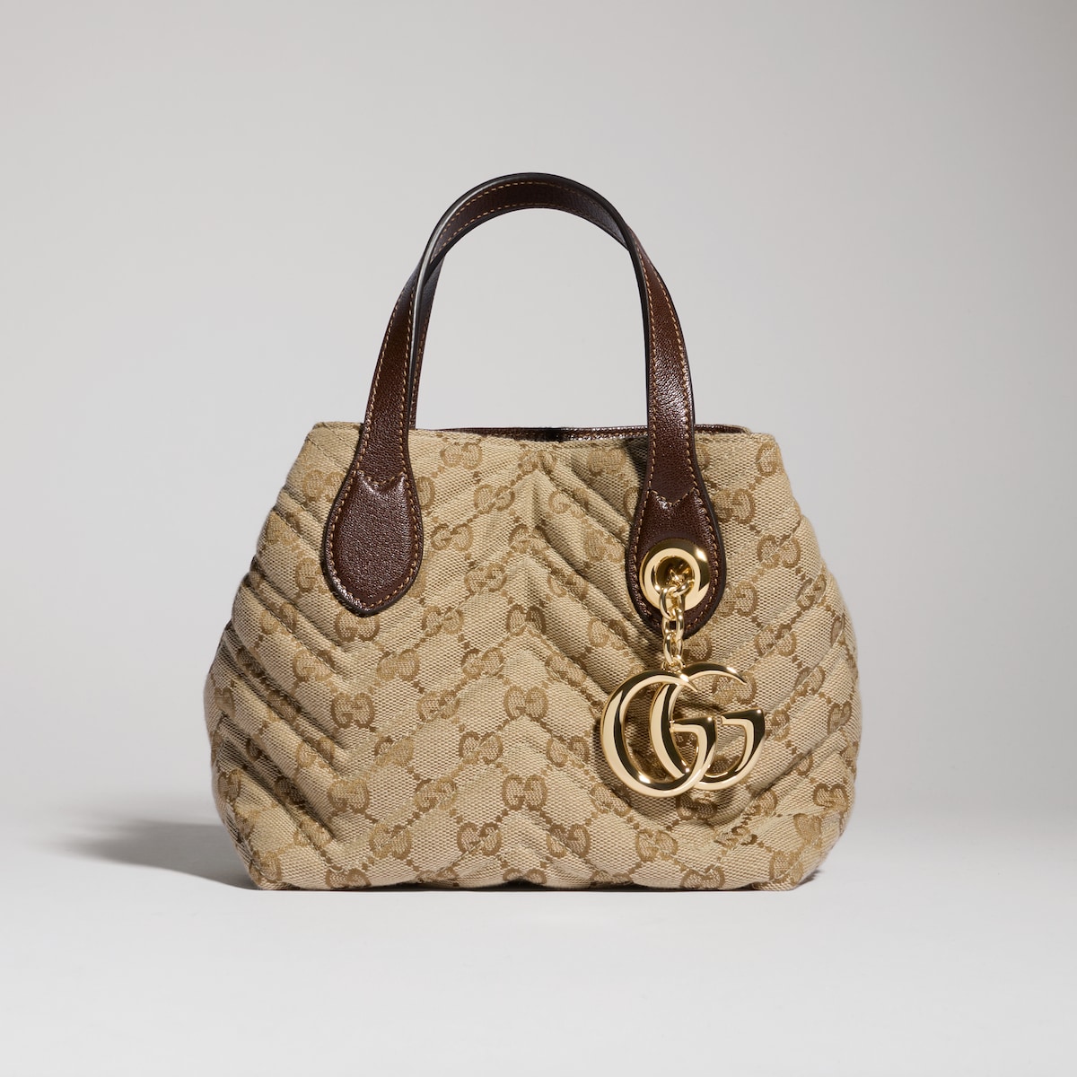 GG Marmont small tote bag in sand and brown GG canvas | GUCCI® IE