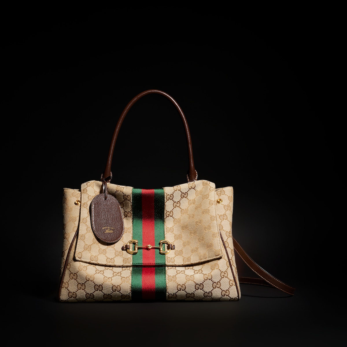 Paparazzo medium top handle bag in sand and brown GG canvas | GUCCI® US