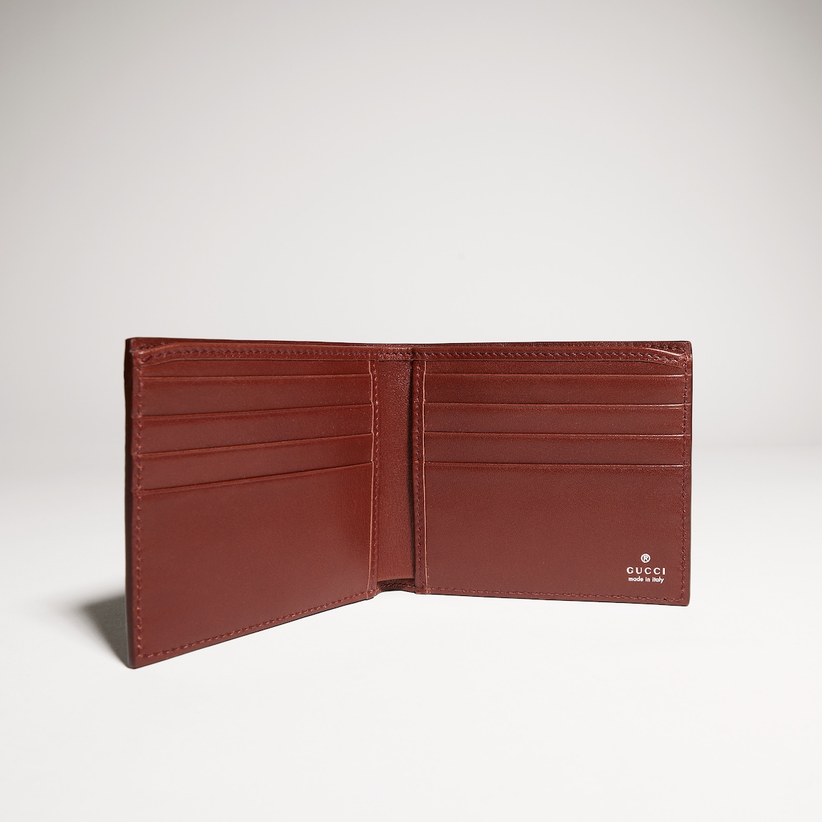 Aria bi-fold wallet in russet GG leather | GUCCI® AU