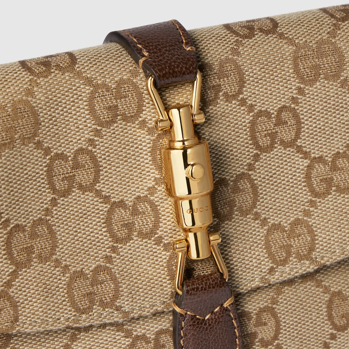 Gucci Jackie small shoulder bag in sand and brown GG canvas | GUCCI® US