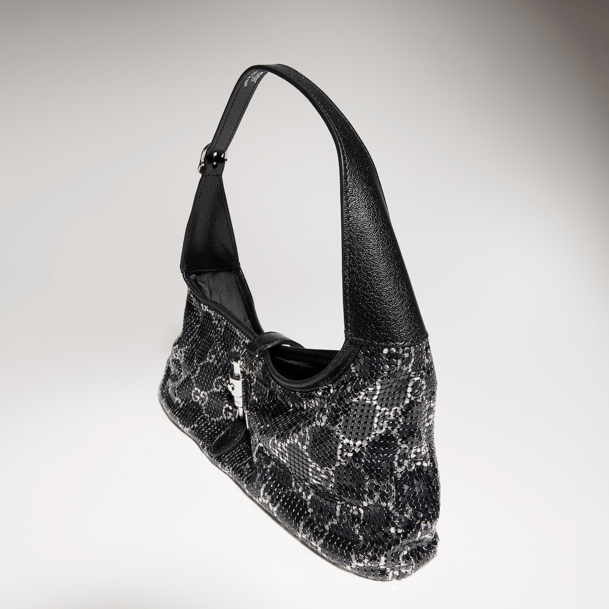 Jackie Slim metallic evening bag in black and silver GG mesh | GUCCI® US