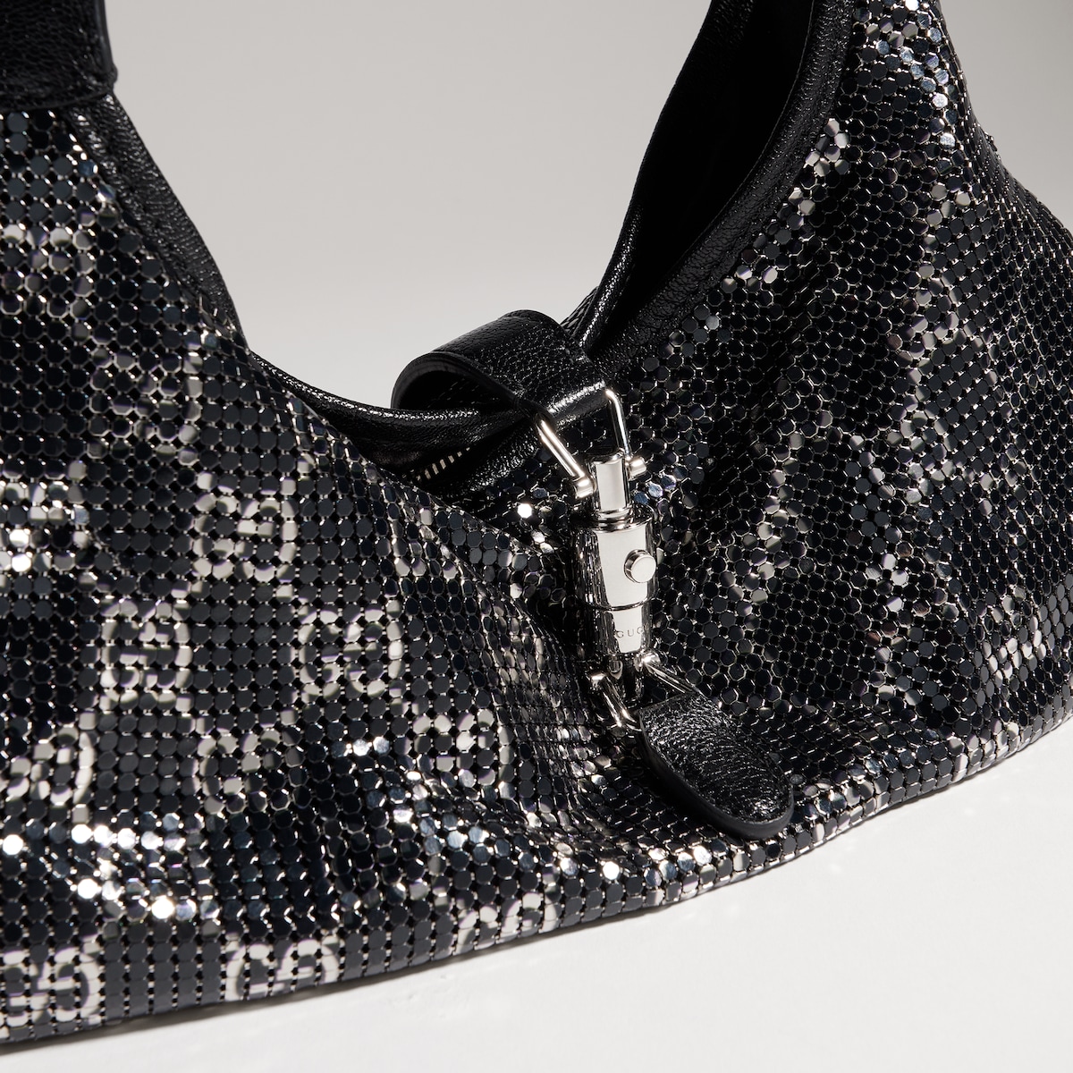 Jackie Slim metallic evening bag in black and silver GG mesh | GUCCI® US