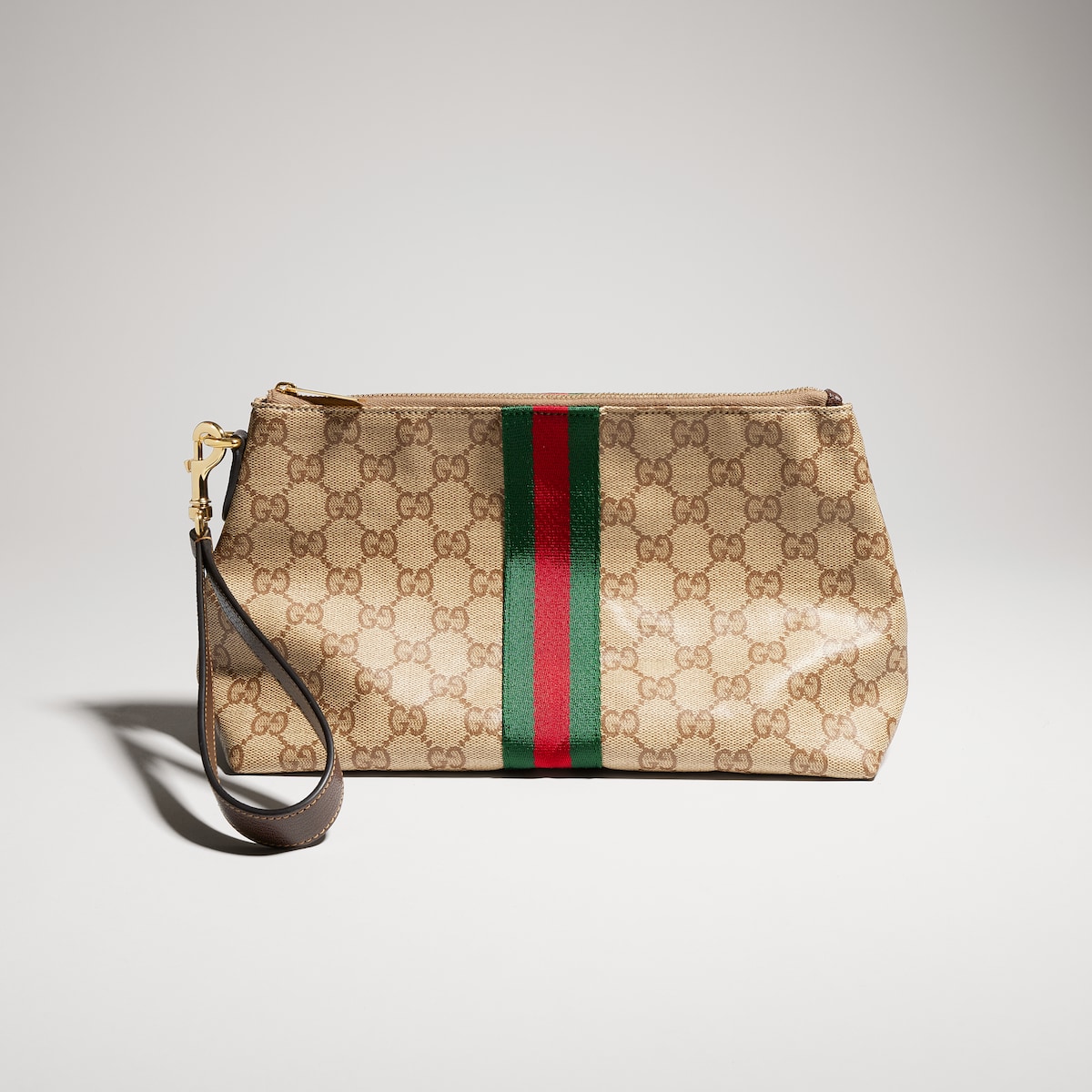 Small GG pouch with Web in sand and brown GG canvas | GUCCI® US