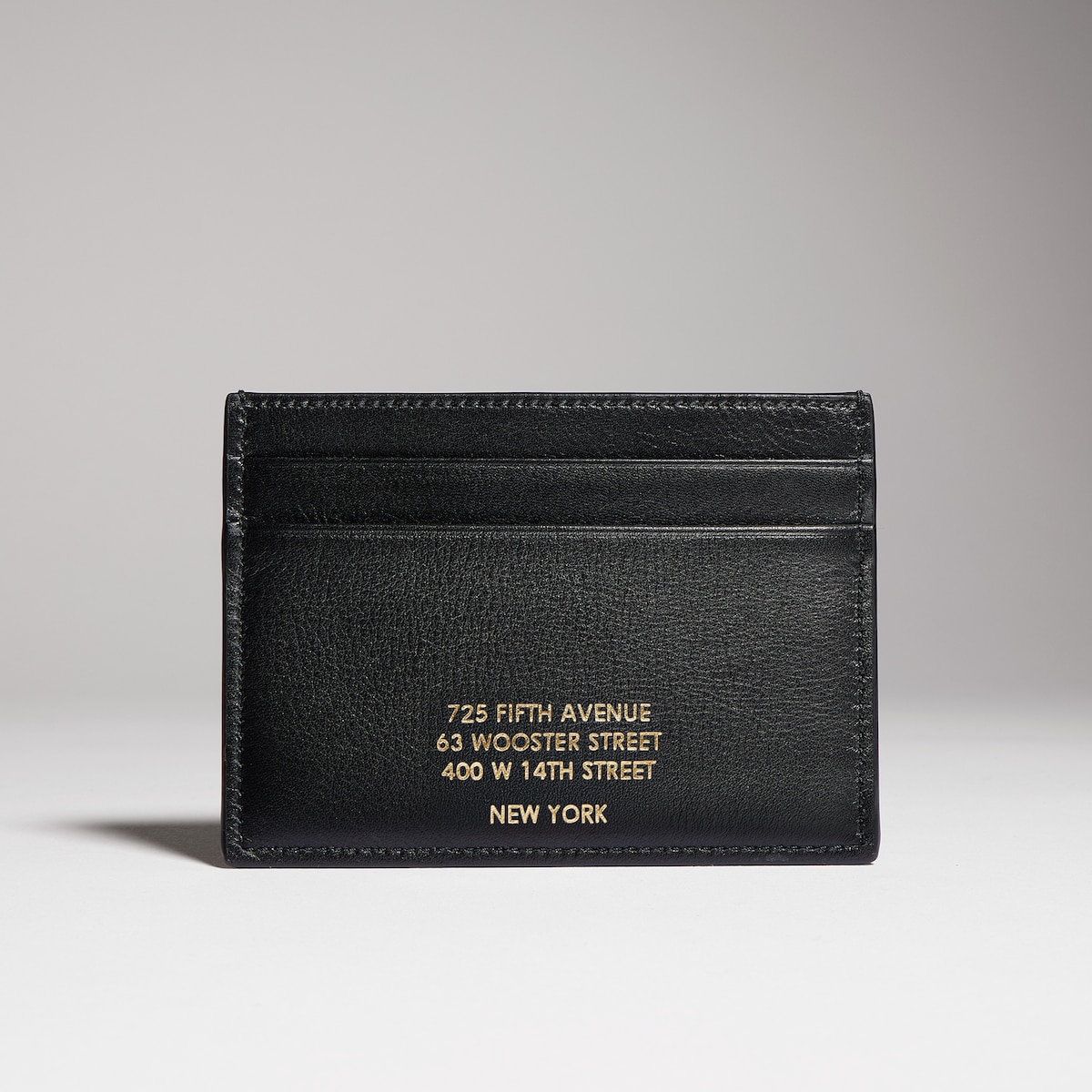 Card case with gold-foiled logo in black leather | GUCCI® CA