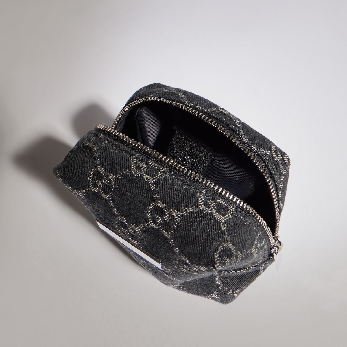 Small cosmetic case with Gucci plaque in black GG denim | GUCCI® SA