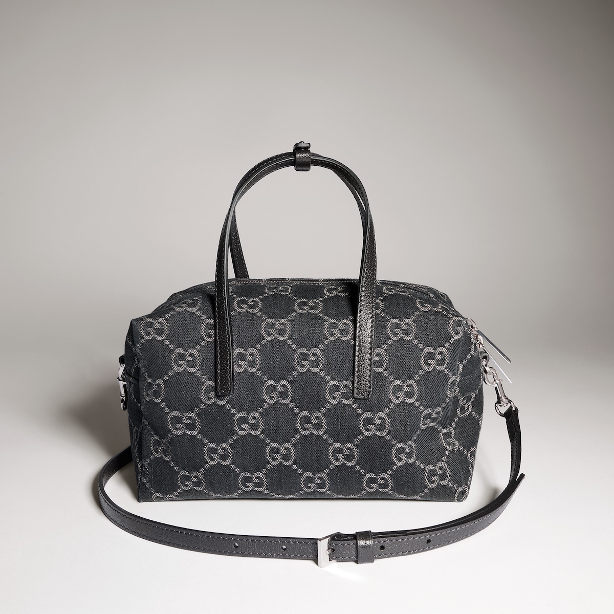 Small boston bag with Gucci plaque in black GG denim | GUCCI® SA