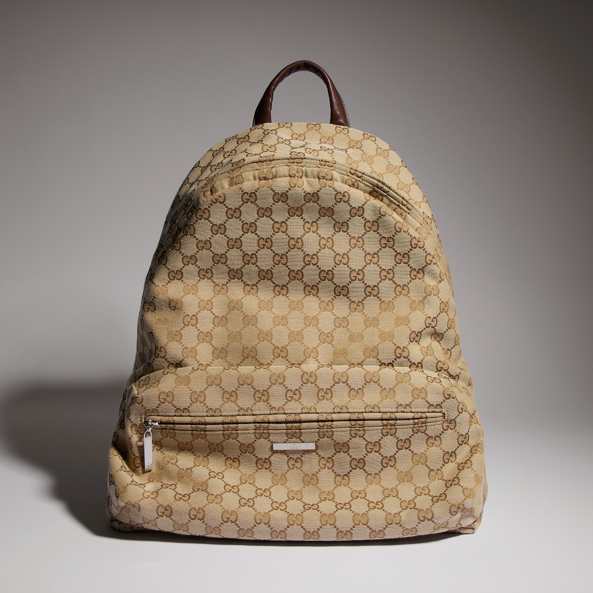Large Gucci Tag backpack in sand and brown GG canvas | GUCCI® CA