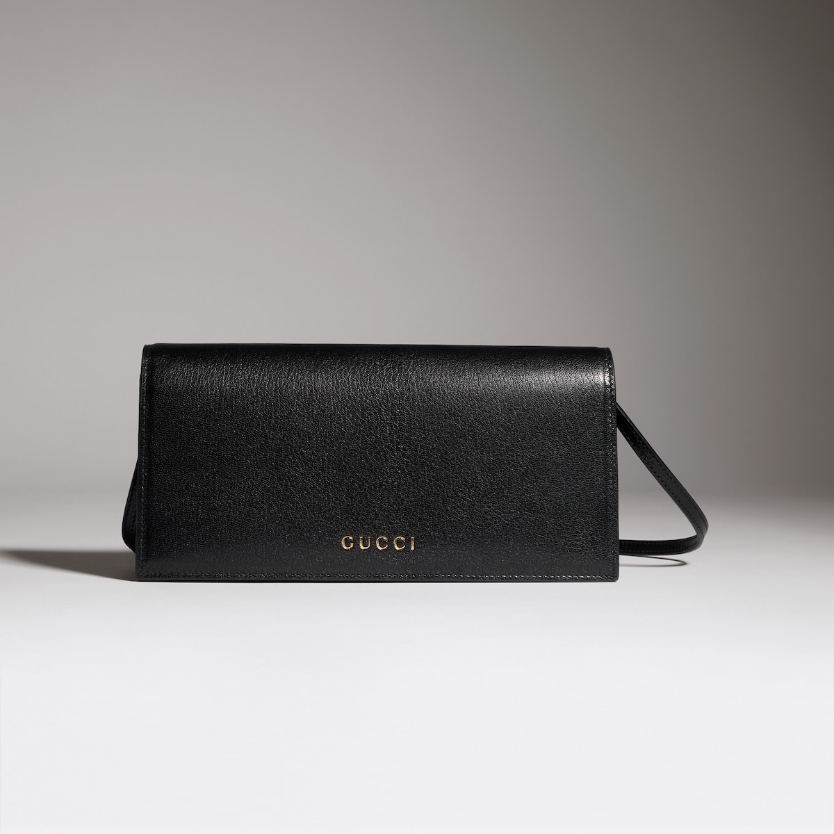 Mini bag with Gucci lettering in black leather | GUCCI® UK