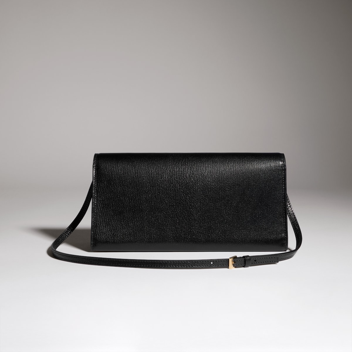 Mini bag with Gucci lettering in black leather | GUCCI® UK