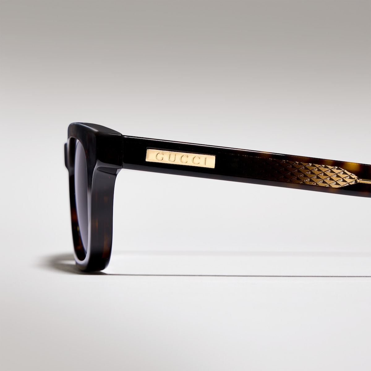 Rectangular-frame sunglasses in brown tortoiseshell | GUCCI® SA