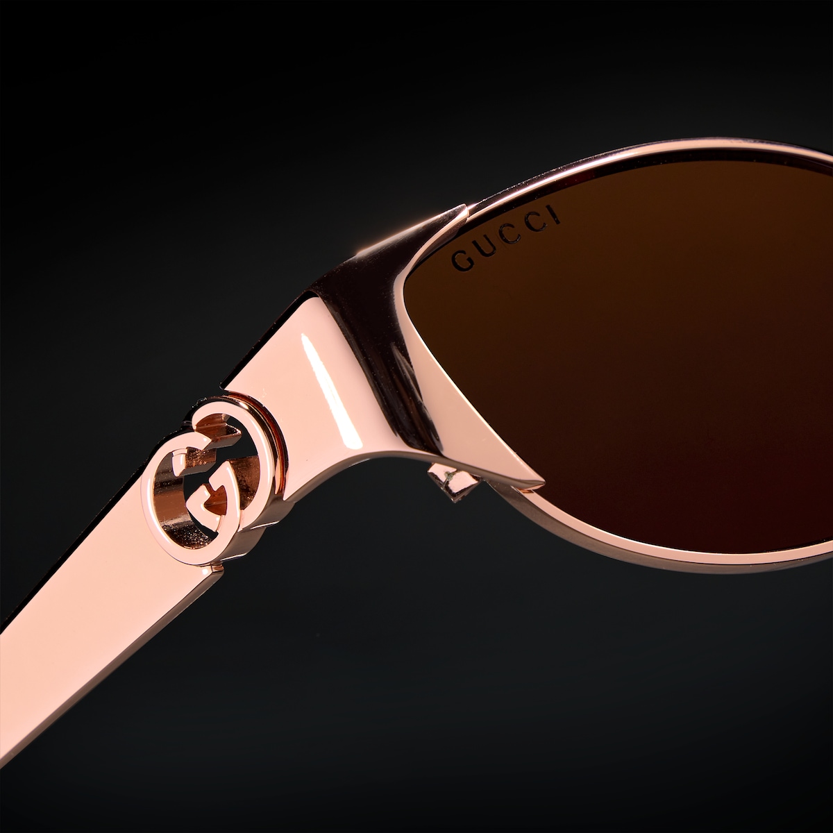 Oval-frame sunglasses in gold-toned | GUCCI® US