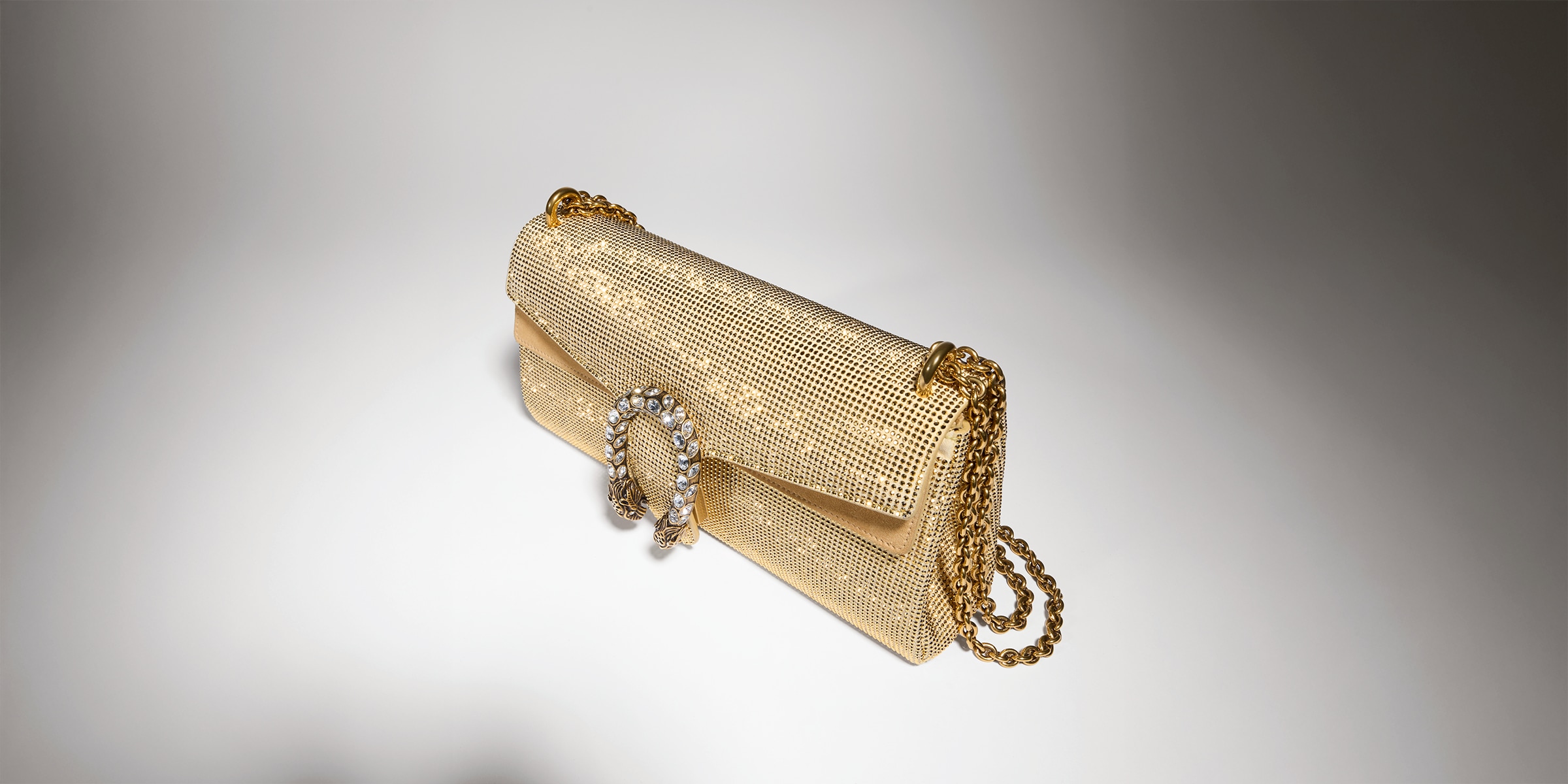 Dionysus crystal medium shoulder bag in gold suede | GUCCI® US