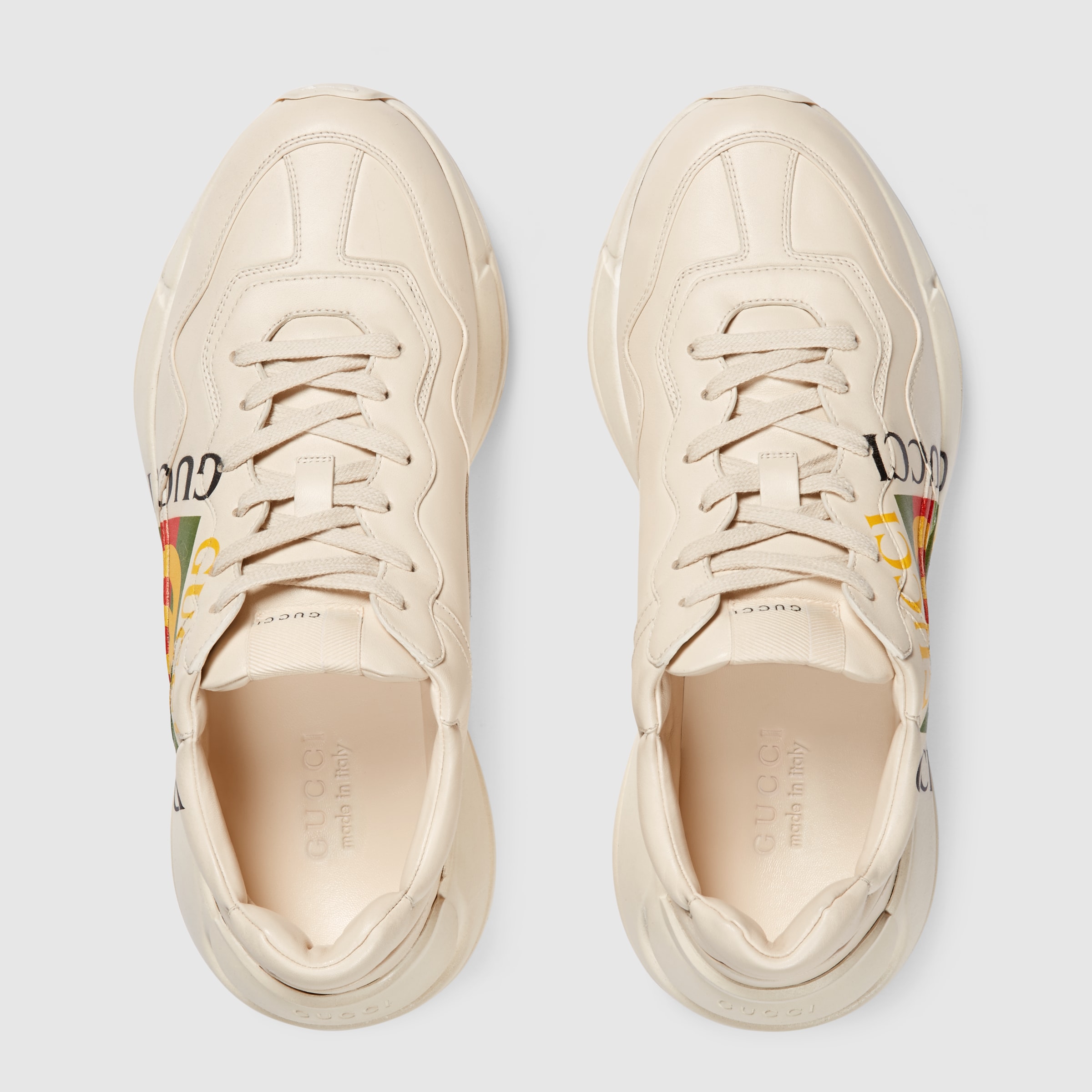 Sneaker Rhyton uomo con logo Gucci in pelle avorio | GUCCI® CH