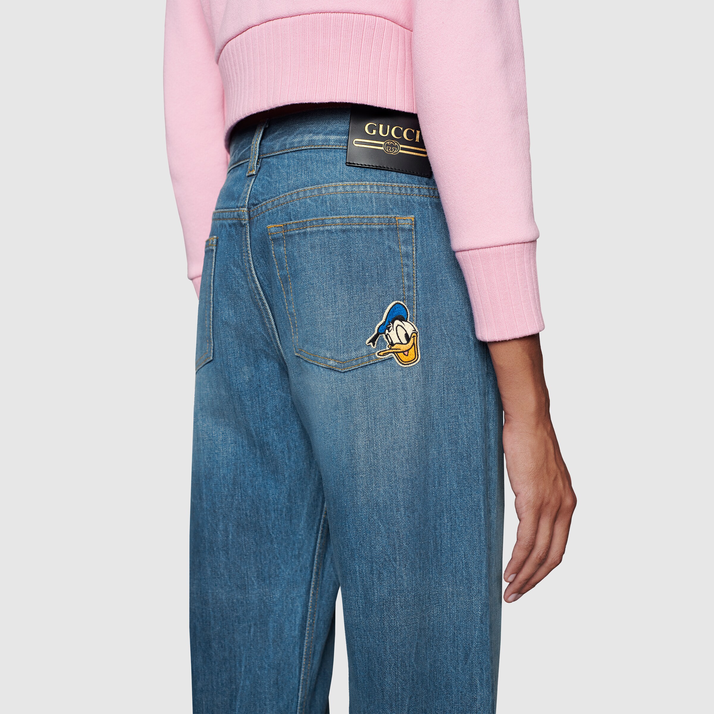 Blue Disney x Gucci Donald Duck eco denim jeans | GUCCI® BG