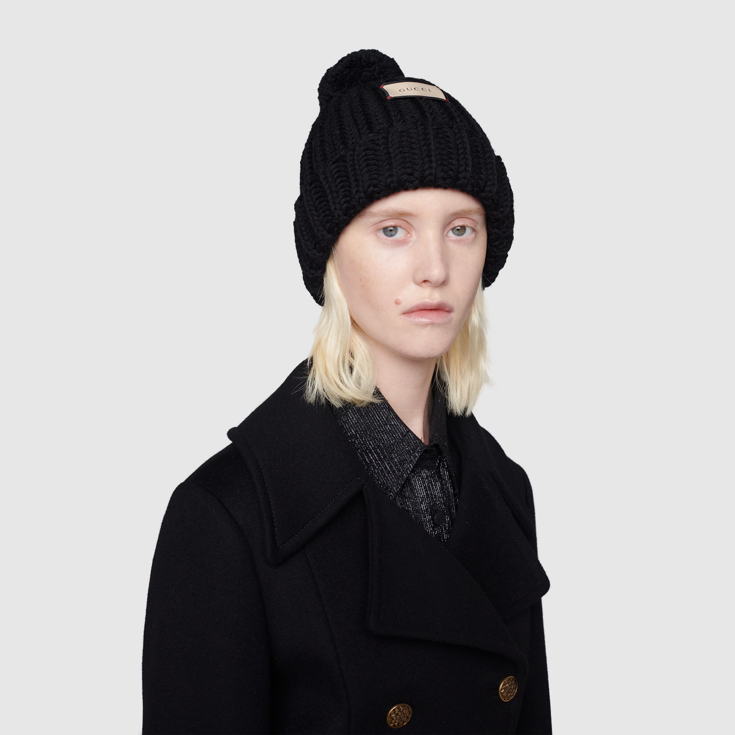 Knit wool hat with Gucci label in black | GUCCI® Canada