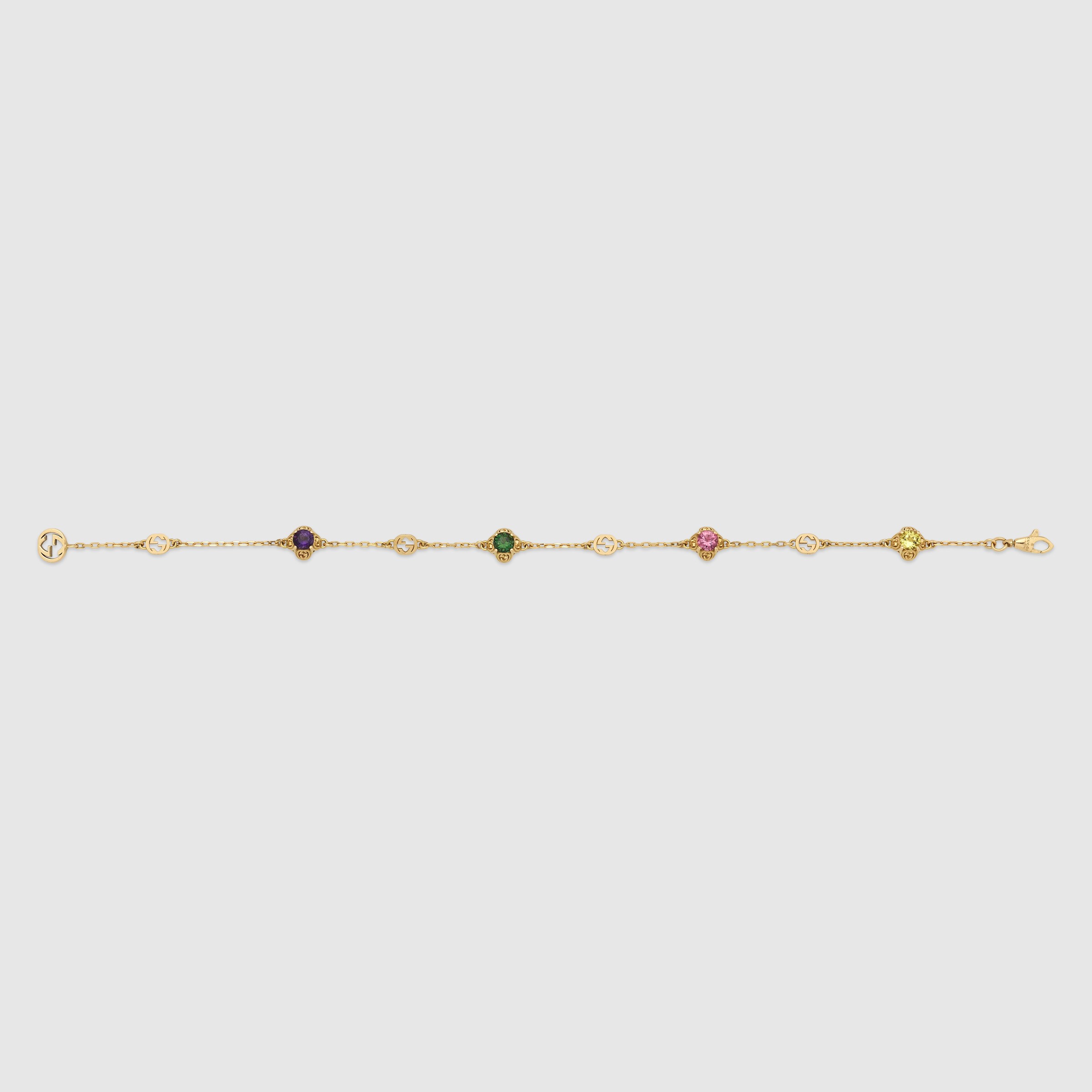Interlocking G bracelet with gemstones in 18k yellow gold | GUCCI® SE