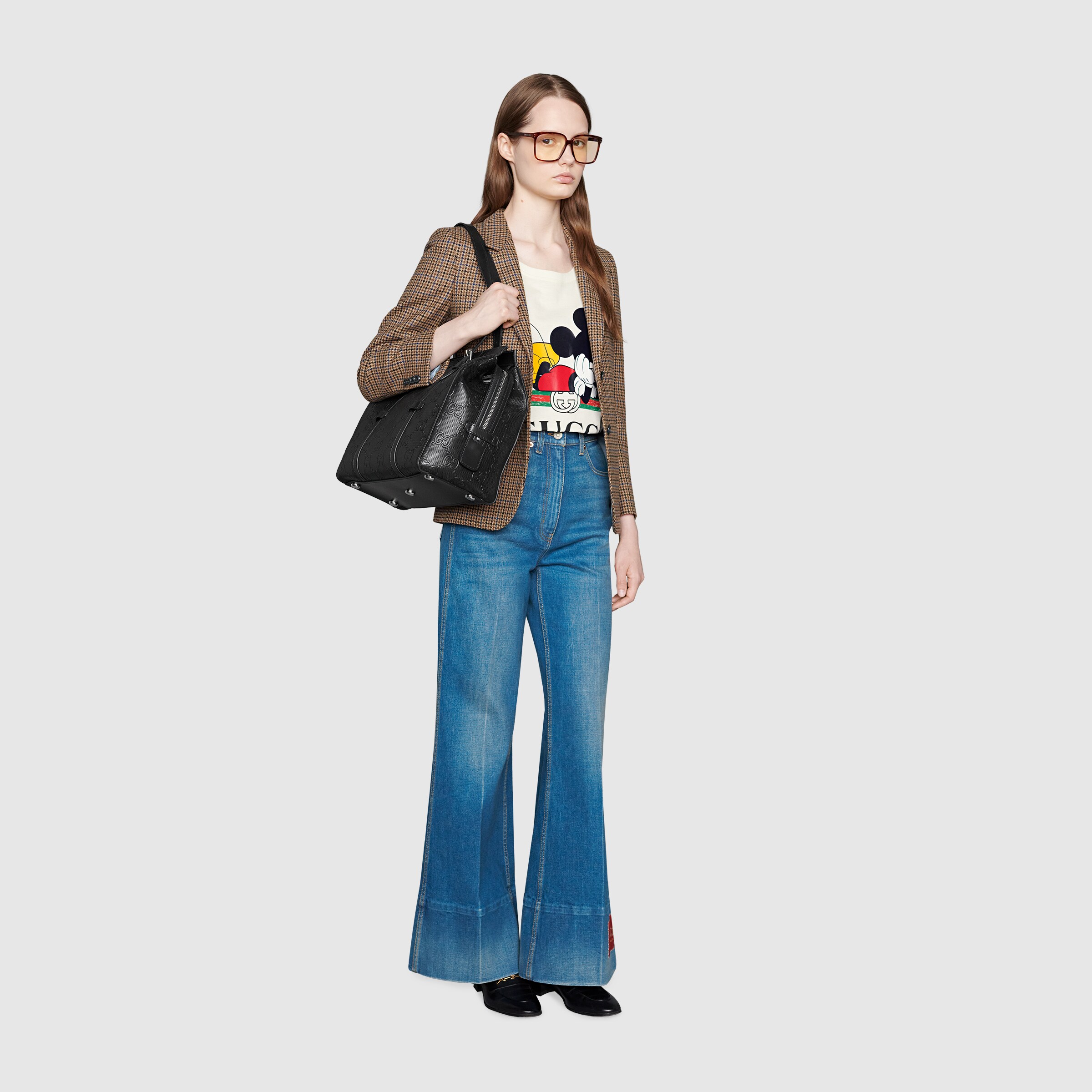 GG embossed tote bag in black leather | GUCCI® BE