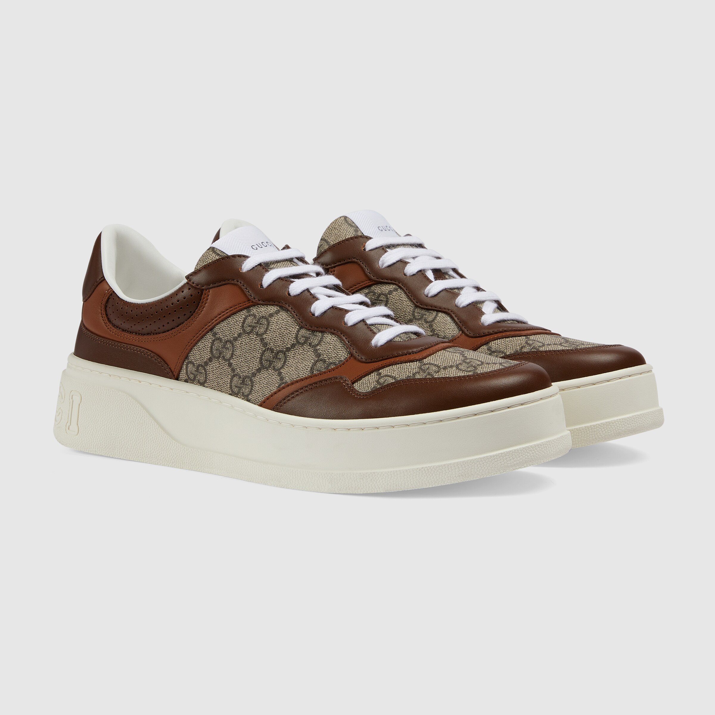 Men's GG trainer in beige and ebony GG Supreme | GUCCI® Australia